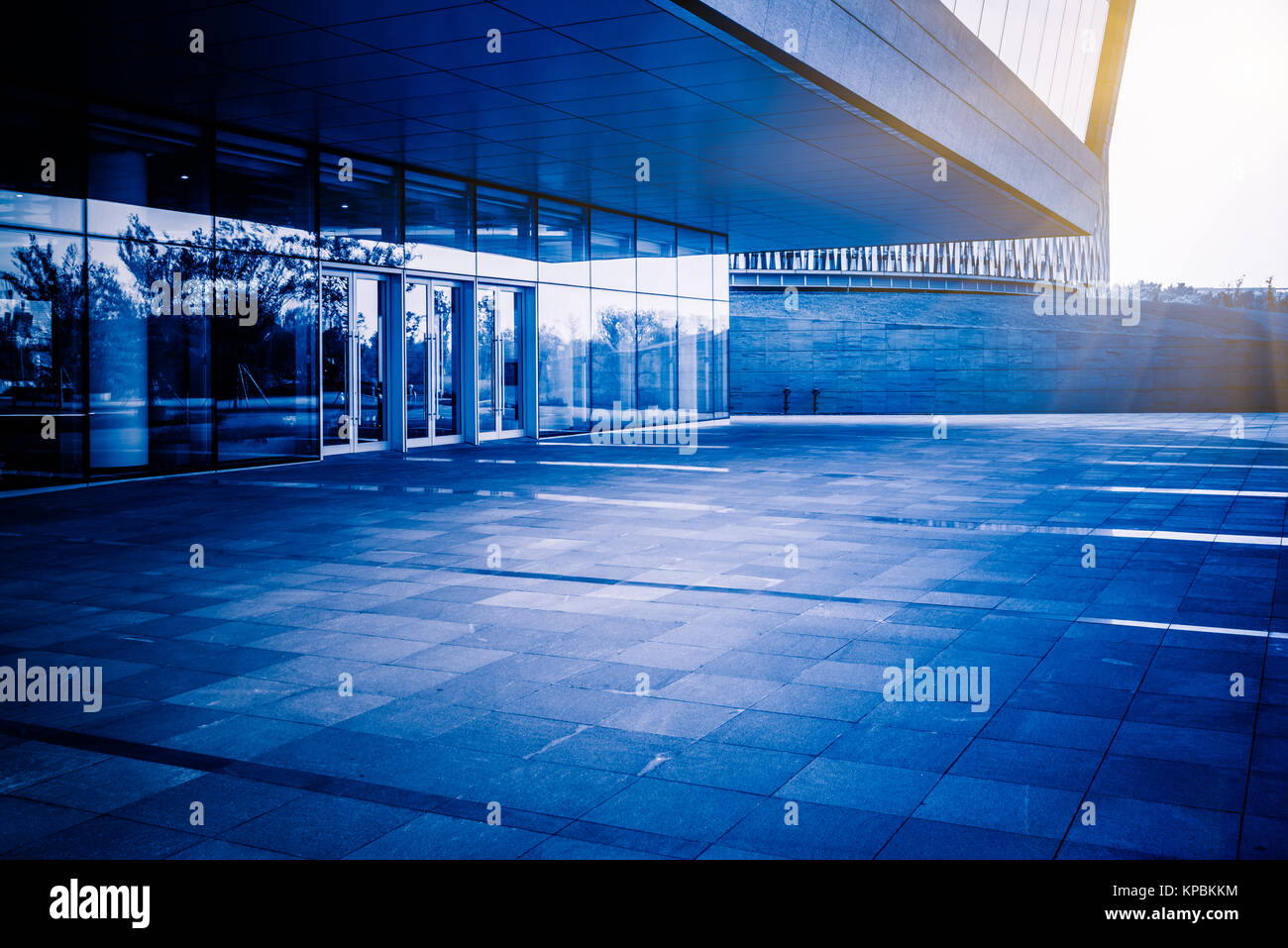 Empty space with modern building in blue tone Stock Photo - Alamy