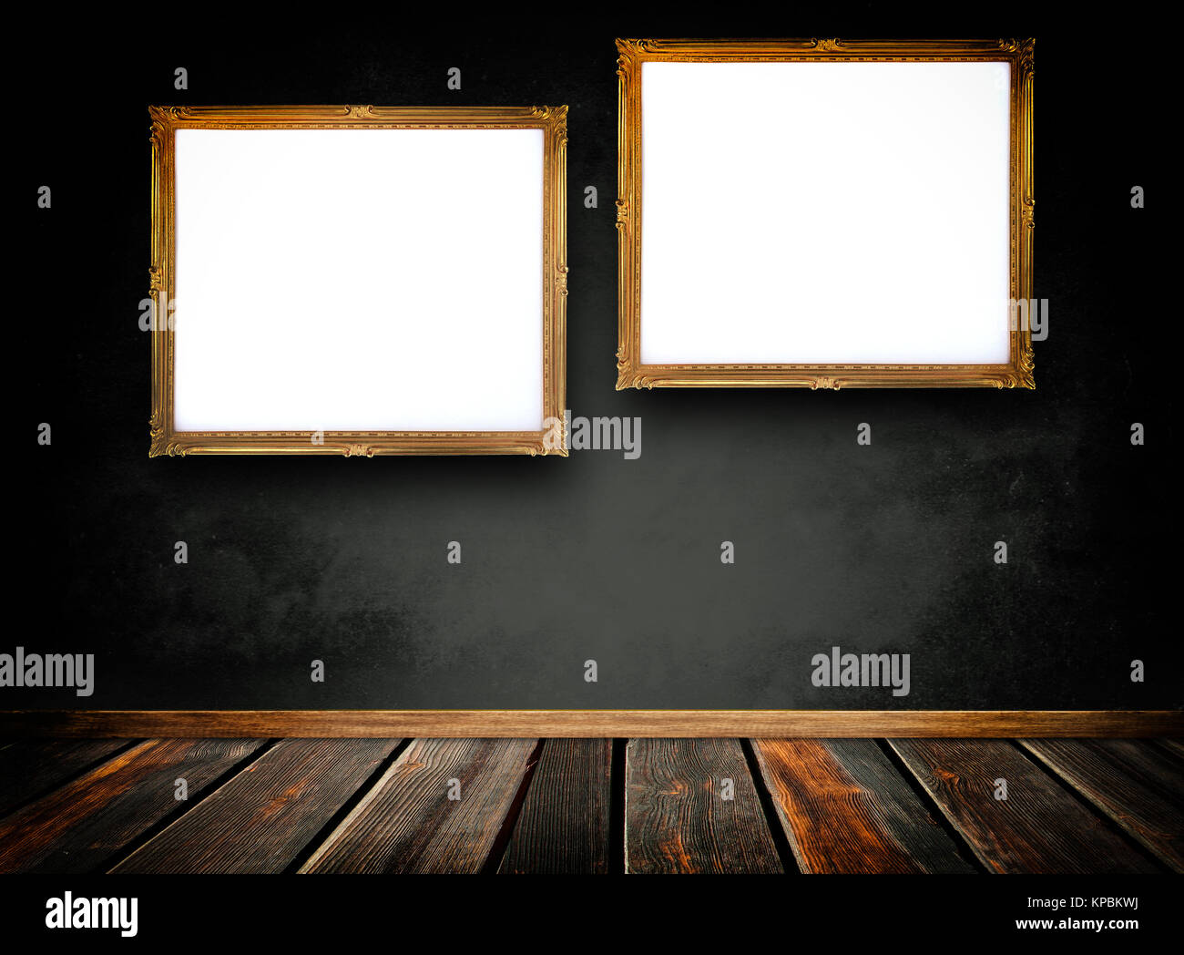 Two old frames on the dark wall Stock Photo - Alamy