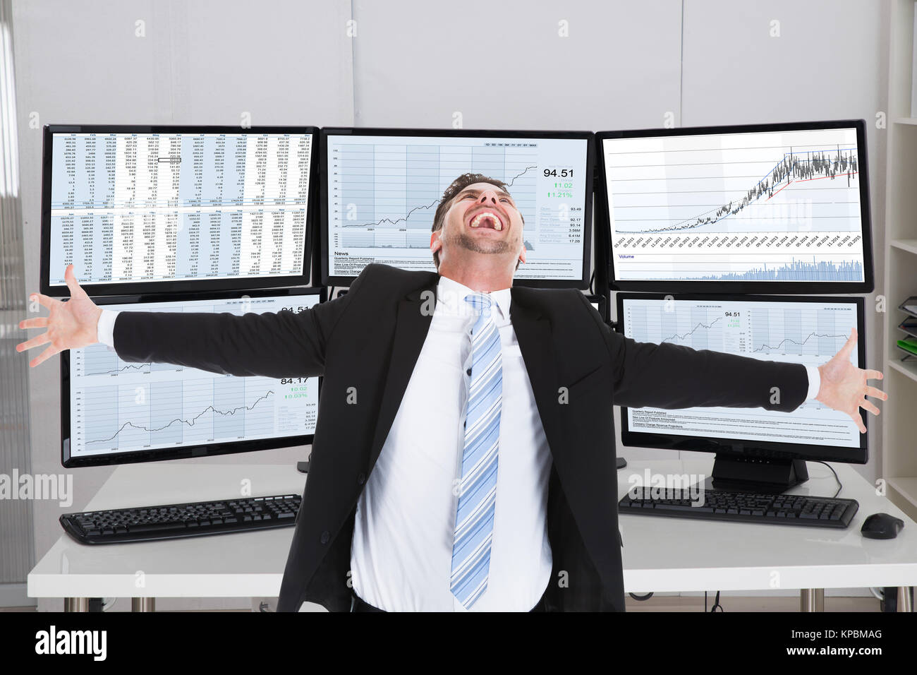 Broker Laughing While Standing With Arms Outstretched Stock Photo - Alamy
