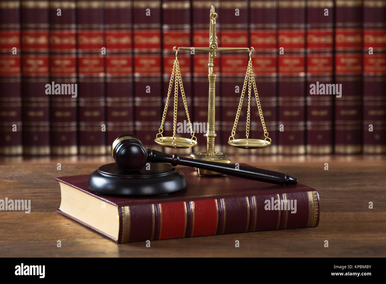 Mallet And Legal Book With Justice Scale On Table Stock Photo - Alamy