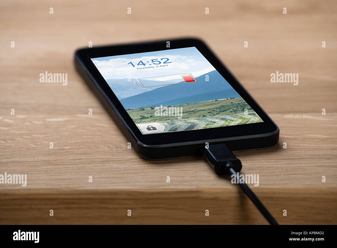 Closeup Of Smart Phone Connected To Charger Stock Photo - Alamy
