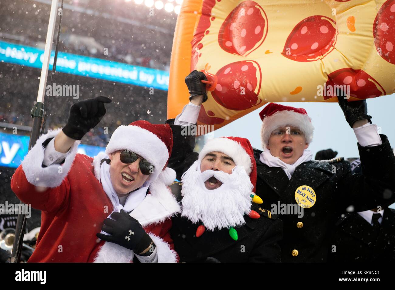 U.S. Navy cadets cheer on their team during the U.S. Army Military ...