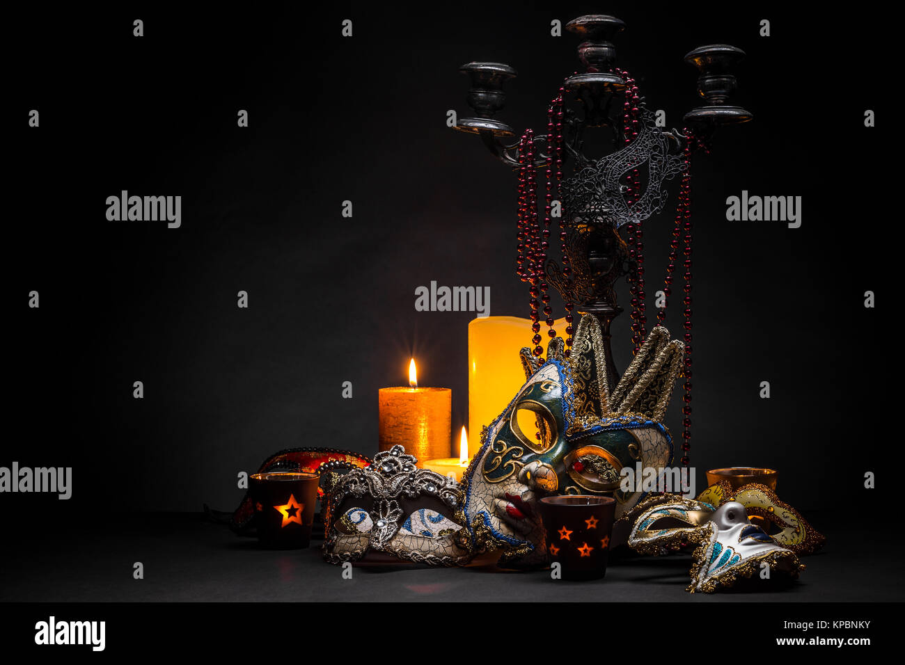 Carnival mask and candle Stock Photo - Alamy