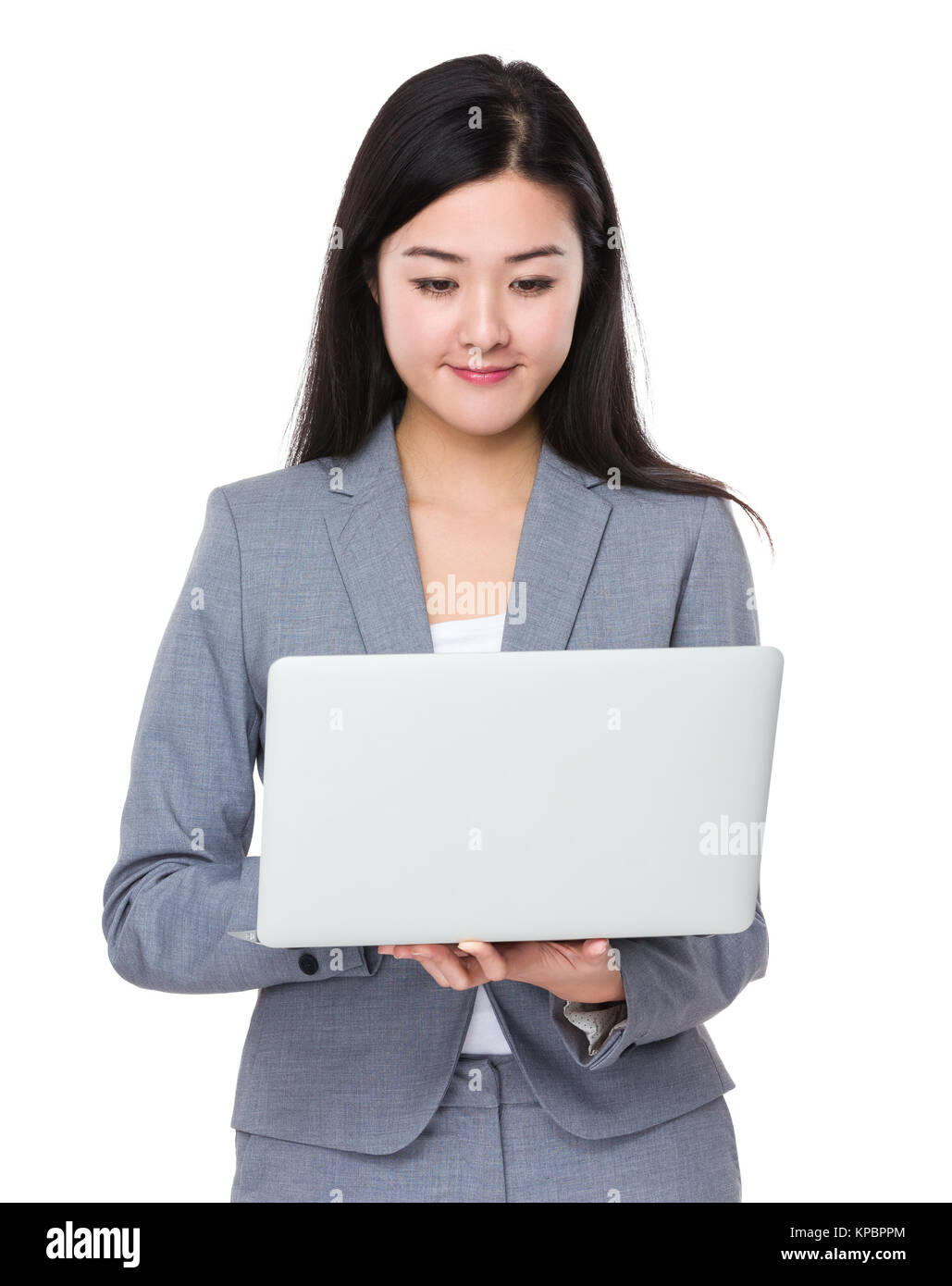 Young businesswoman look at the notebook computer Stock Photo - Alamy