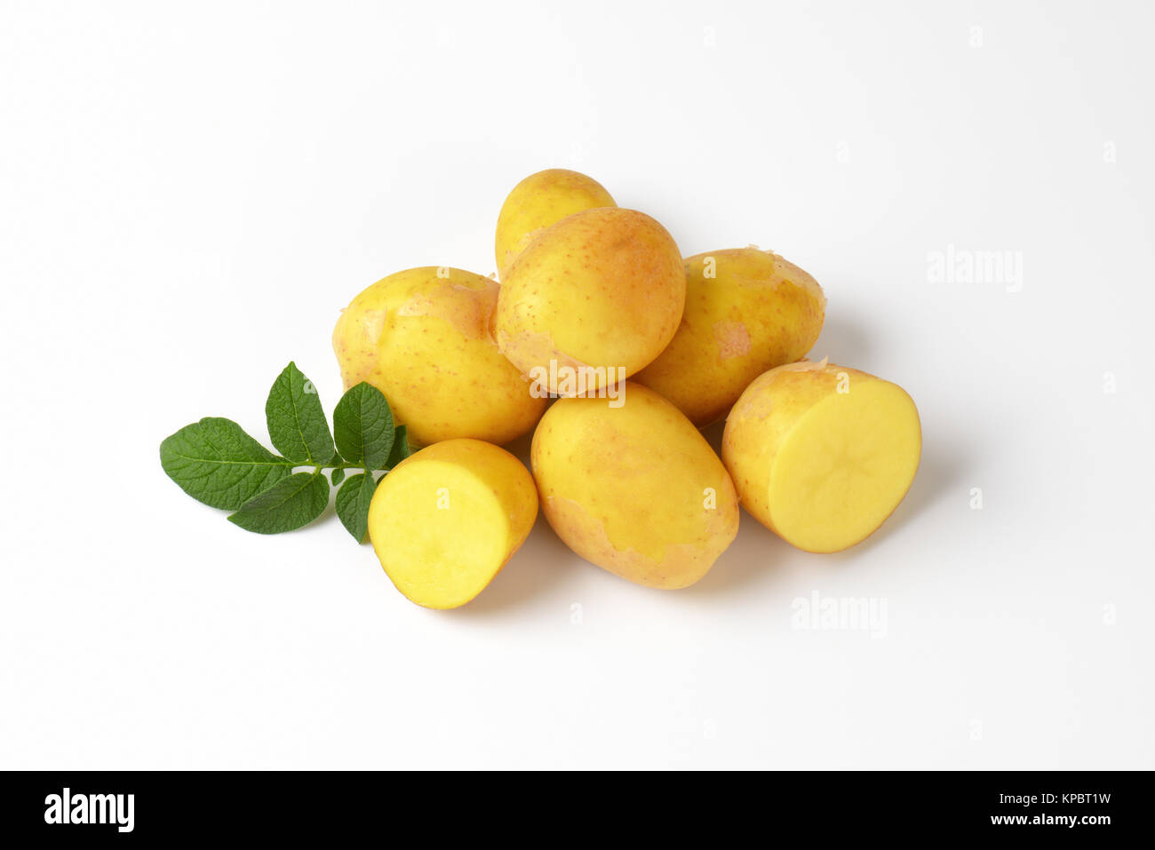 raw unpeeled potatoes Stock Photo - Alamy