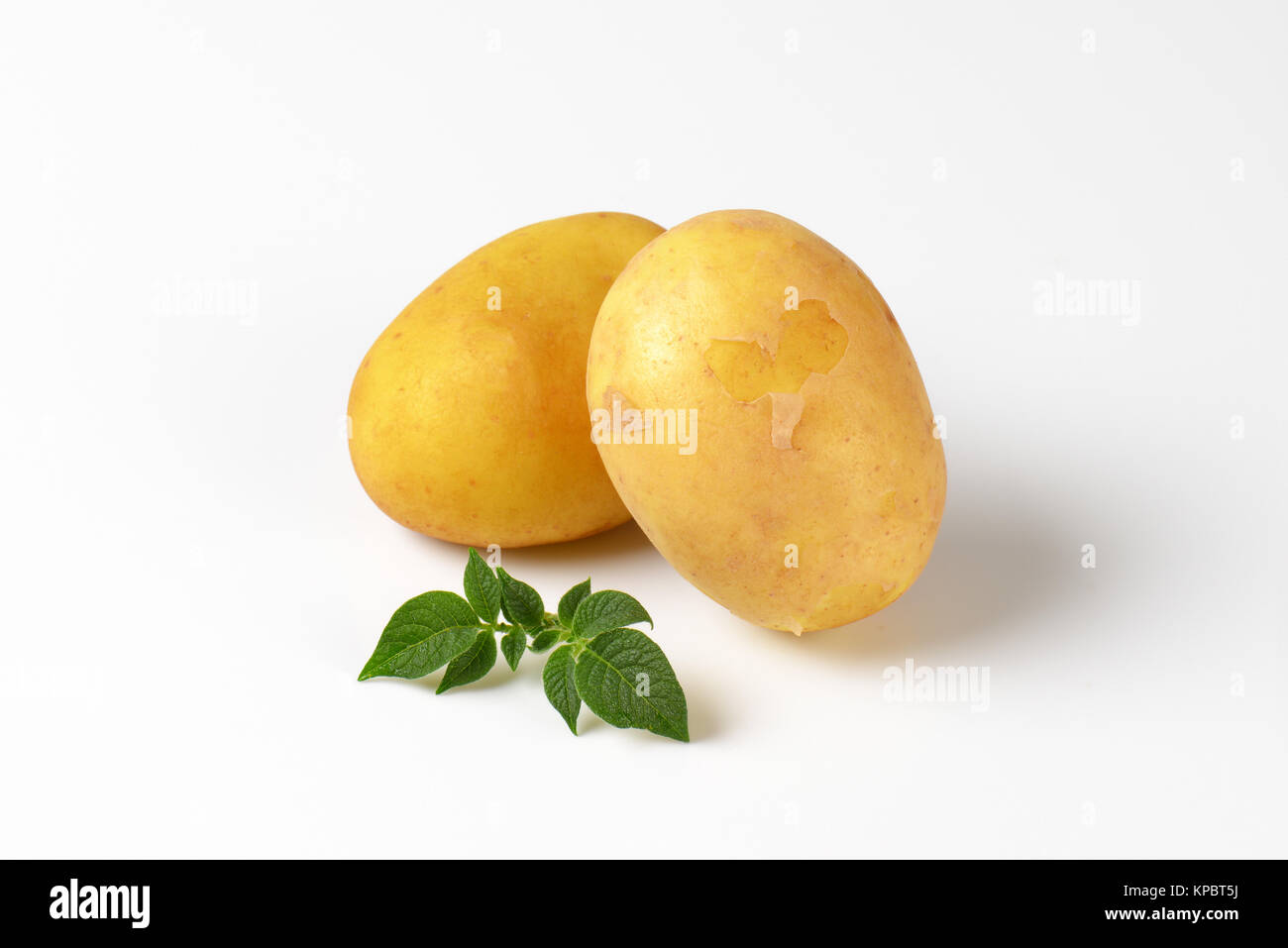 two new potatoes Stock Photo - Alamy
