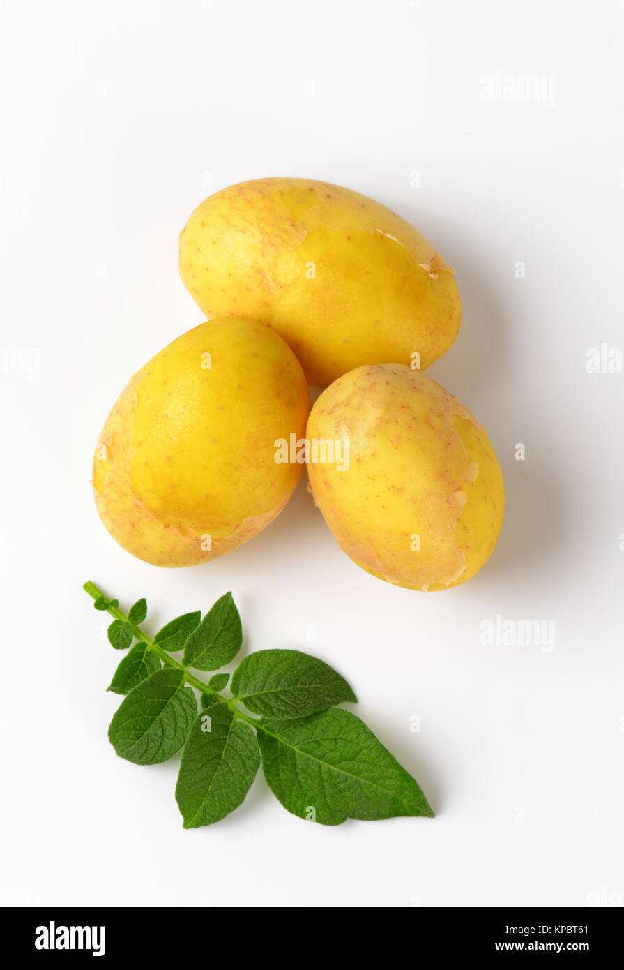 three new potatoes Stock Photo - Alamy