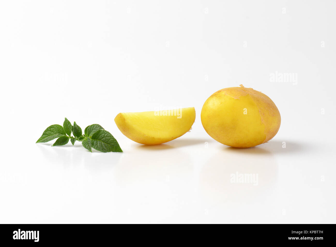 raw unpeeled potatoes Stock Photo - Alamy