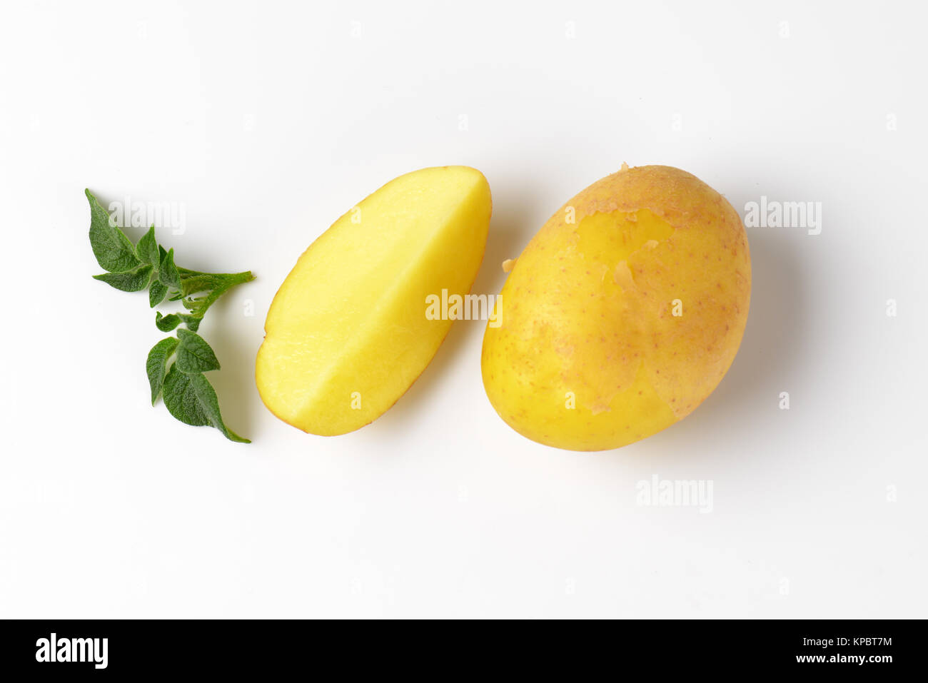 raw unpeeled potatoes Stock Photo - Alamy