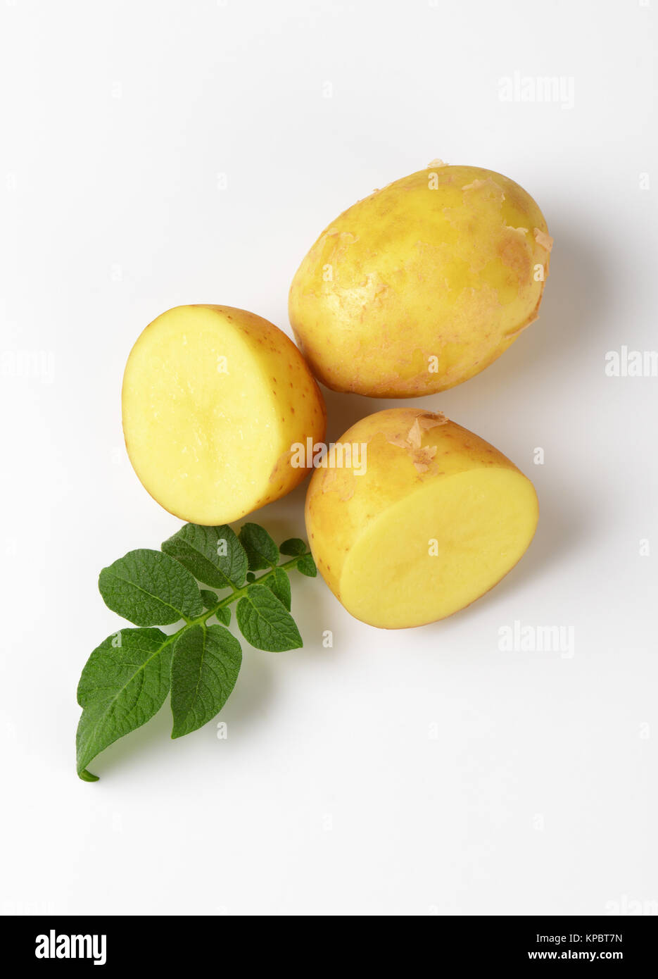 raw unpeeled potatoes Stock Photo - Alamy
