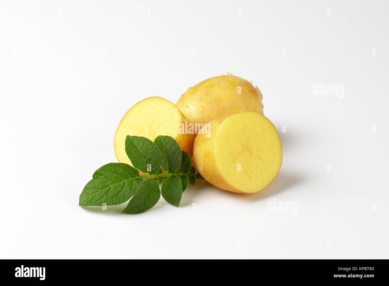 raw unpeeled potatoes Stock Photo - Alamy