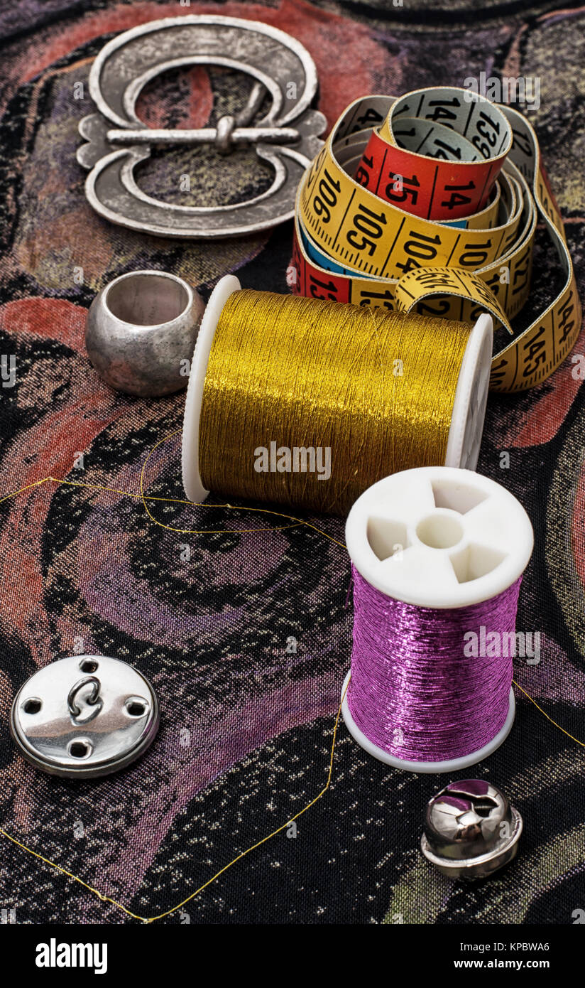 buttons from clothing and thread Stock Photo - Alamy