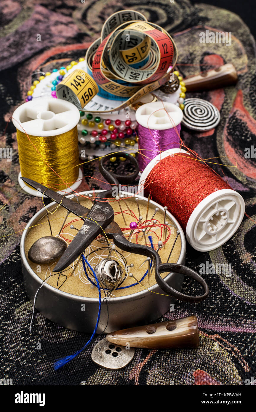 buttons from clothing and thread Stock Photo - Alamy