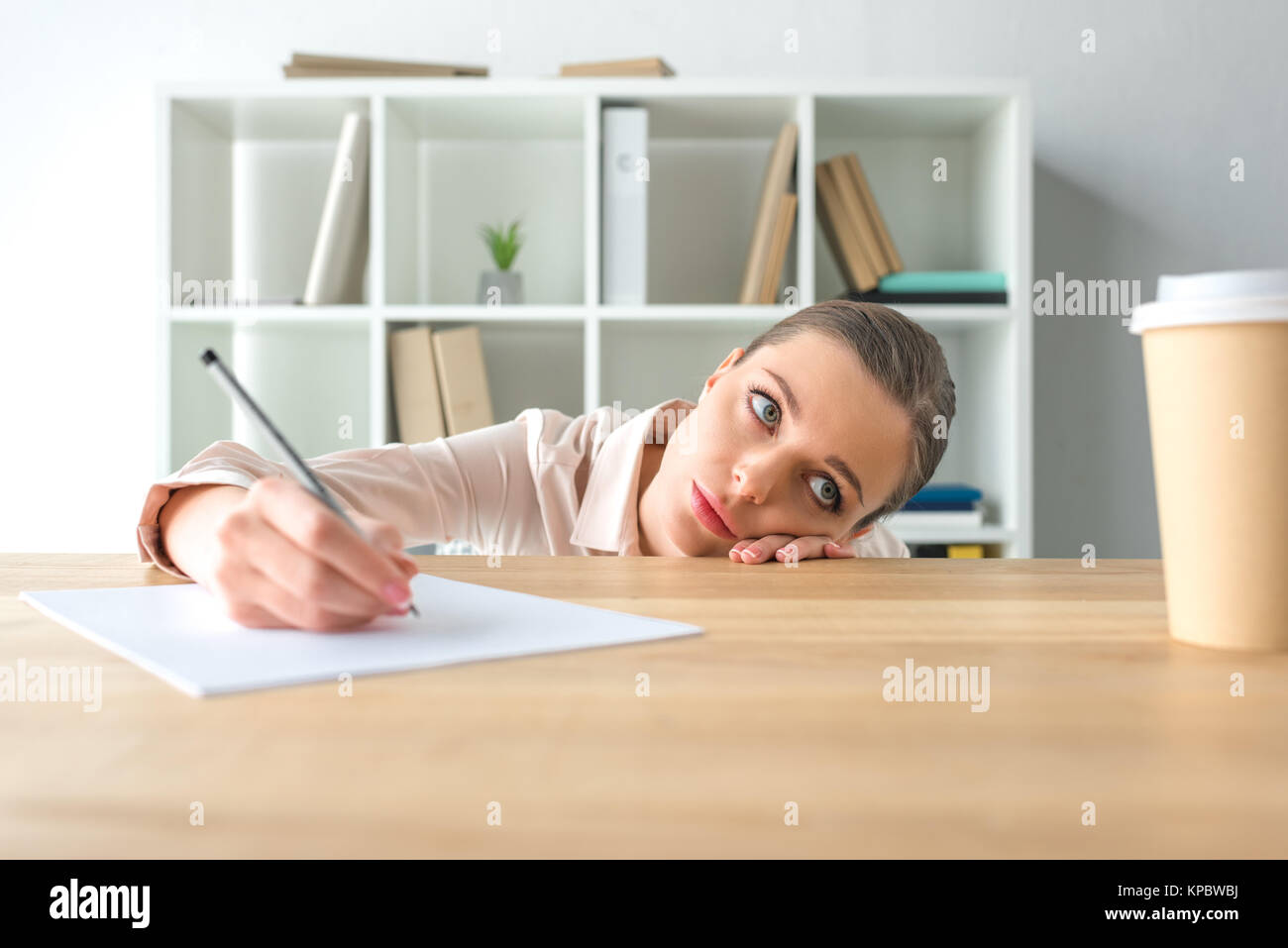 Tired beautiful woman lying on hi-res stock photography and images - Alamy
