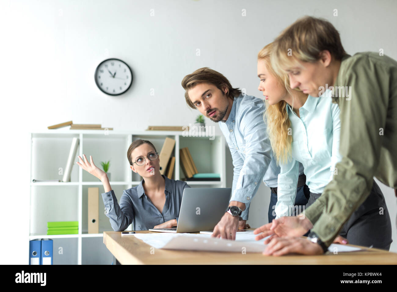Stressed colleagues at office meeting Stock Photo - Alamy