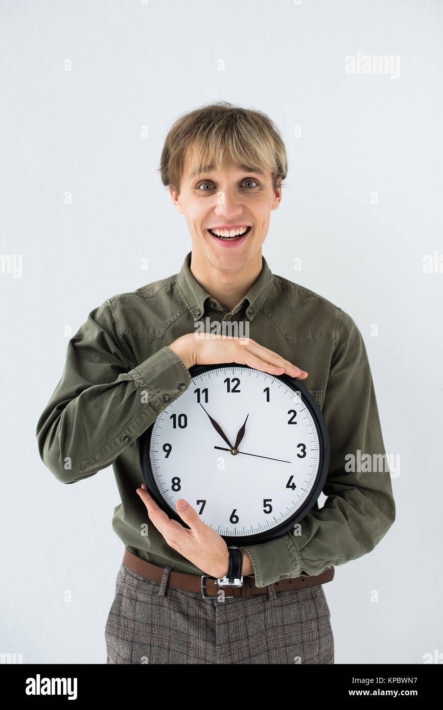 Office smile clock hi-res stock photography and images - Alamy