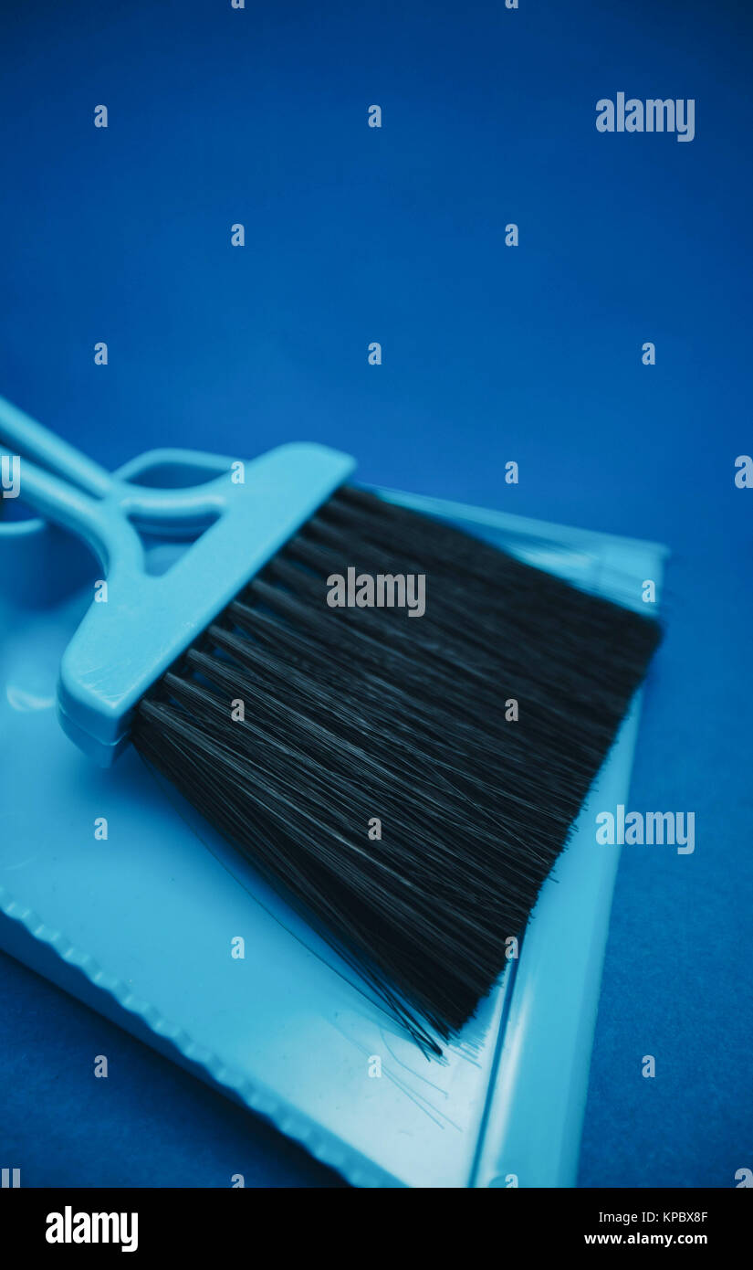 Sweeping dust pan and brush set. Bright composition with blue plastic ...
