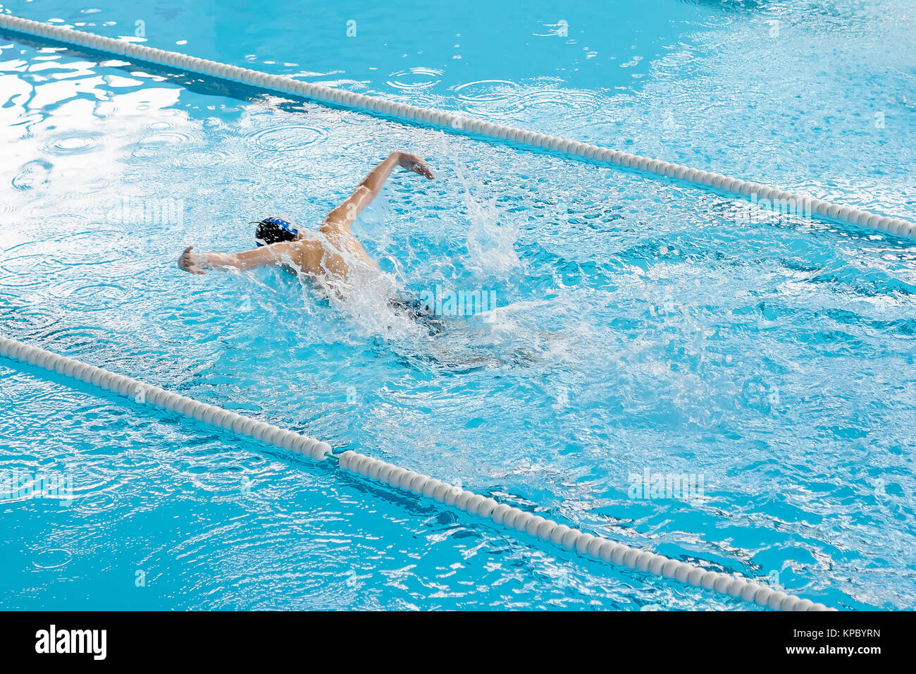 Man swimming in pool Stock Photo - Alamy