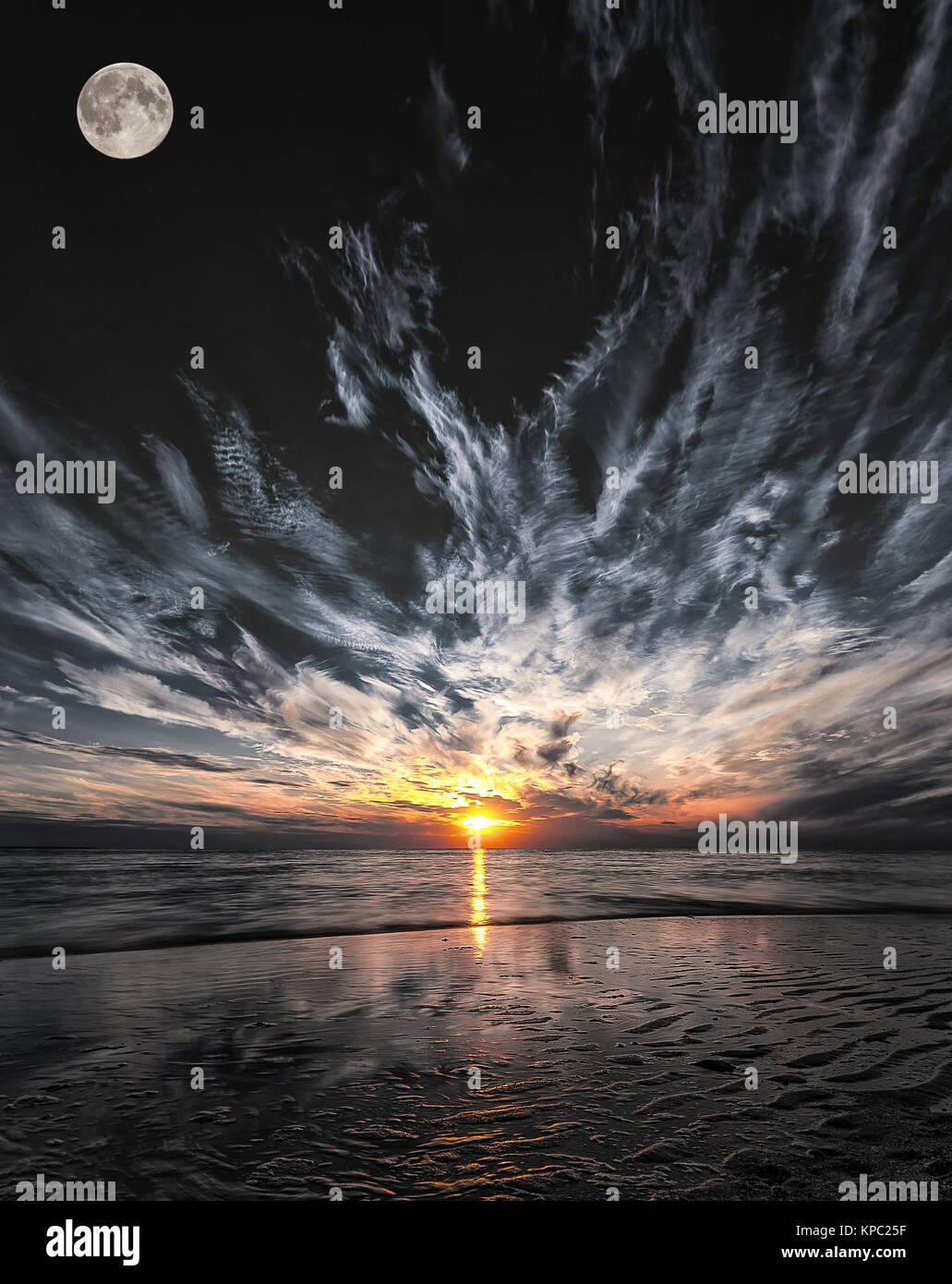 Beautiful sunset on the beach Stock Photo - Alamy