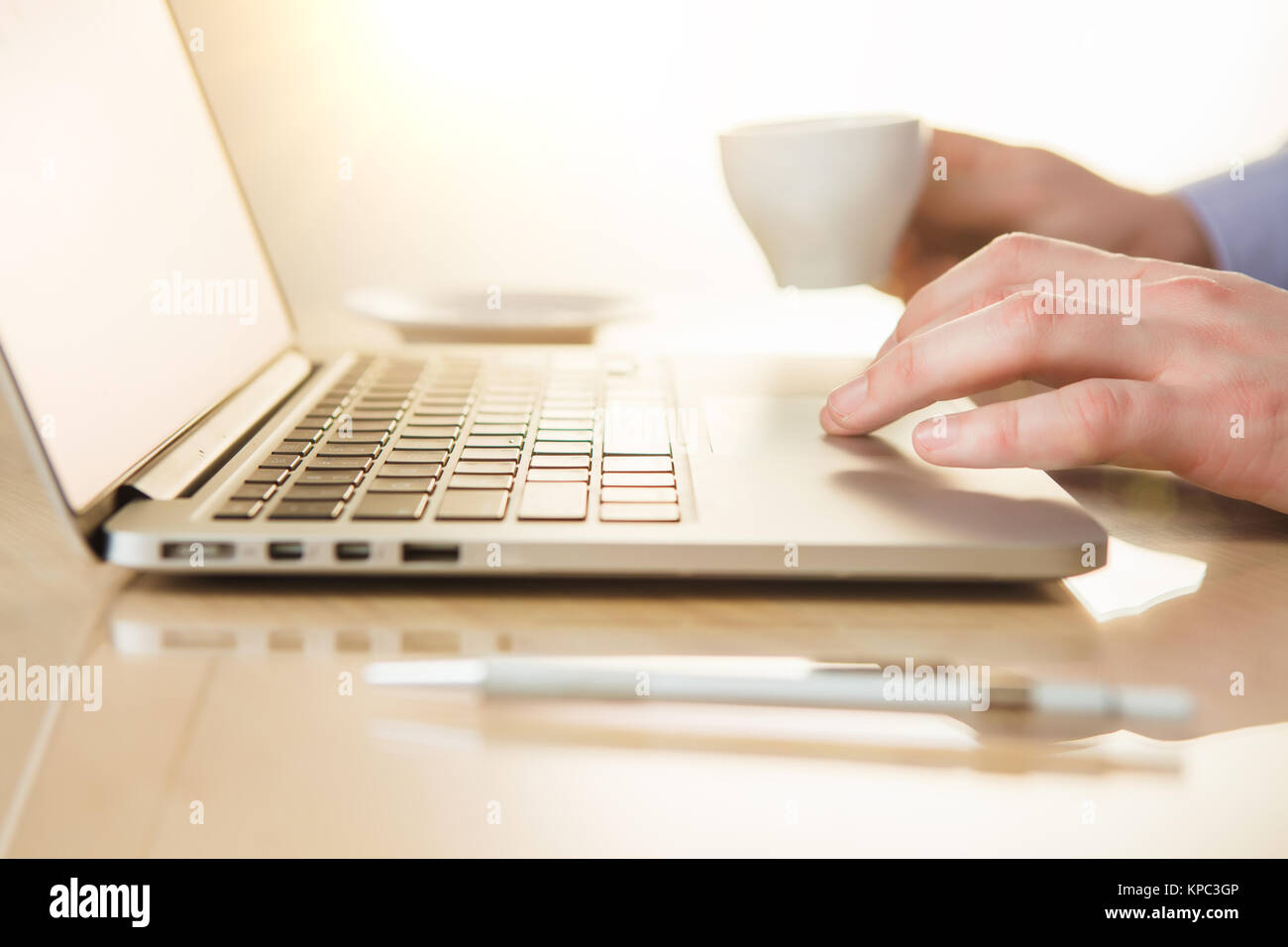 The hand on the keyboard and coffee Stock Photo - Alamy