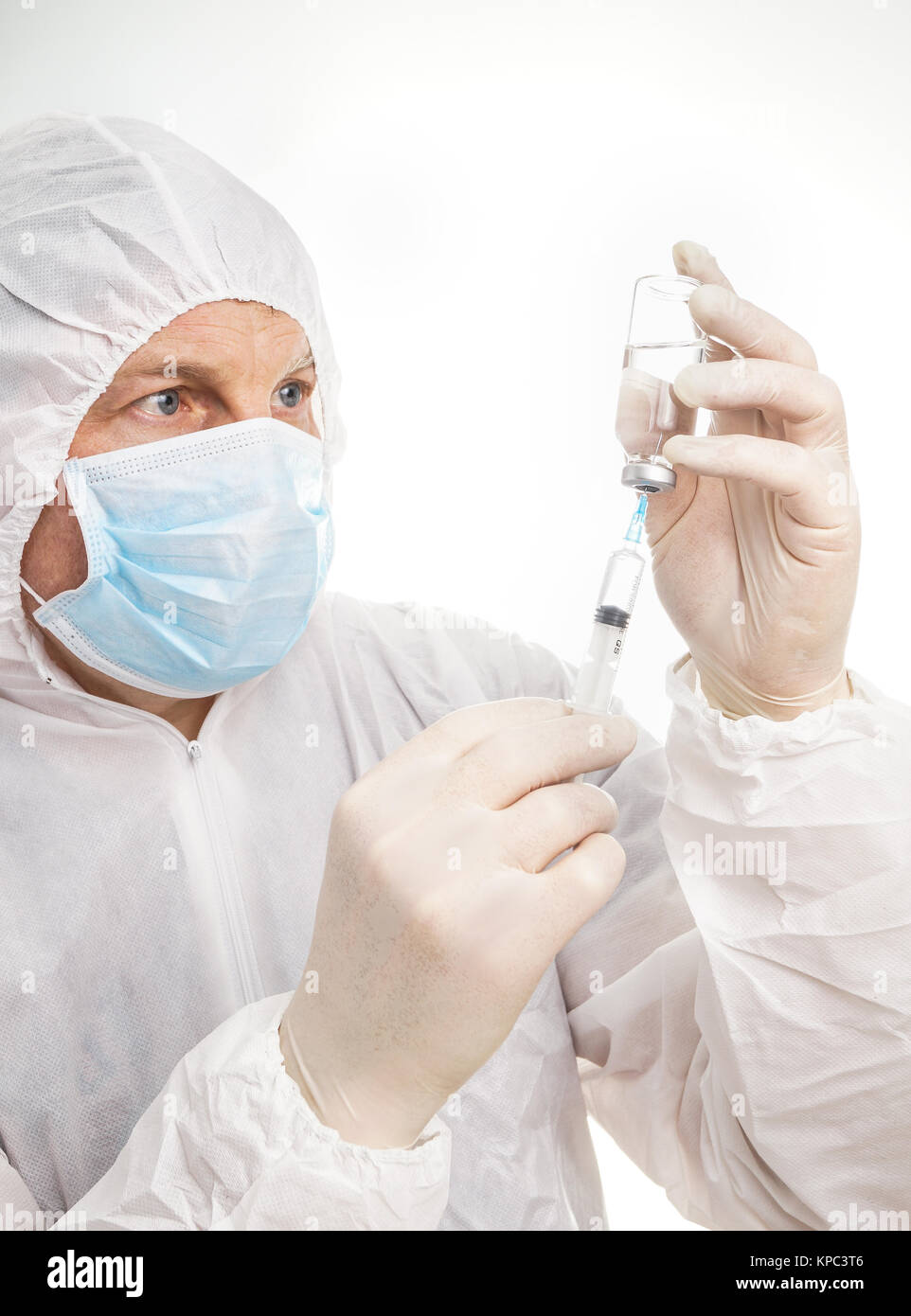 Man with syringe and vial Stock Photo - Alamy