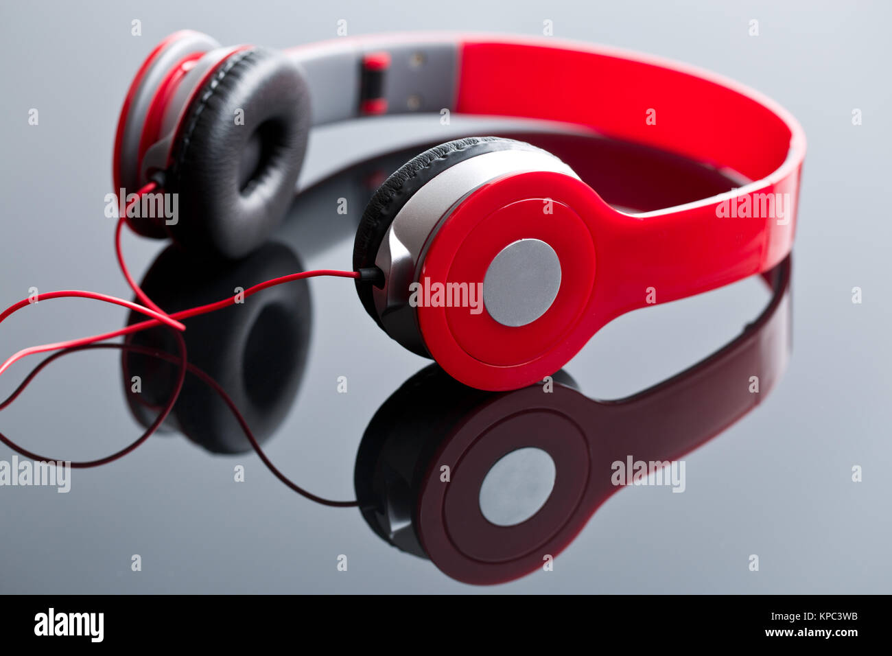 red wired headphones Stock Photo - Alamy