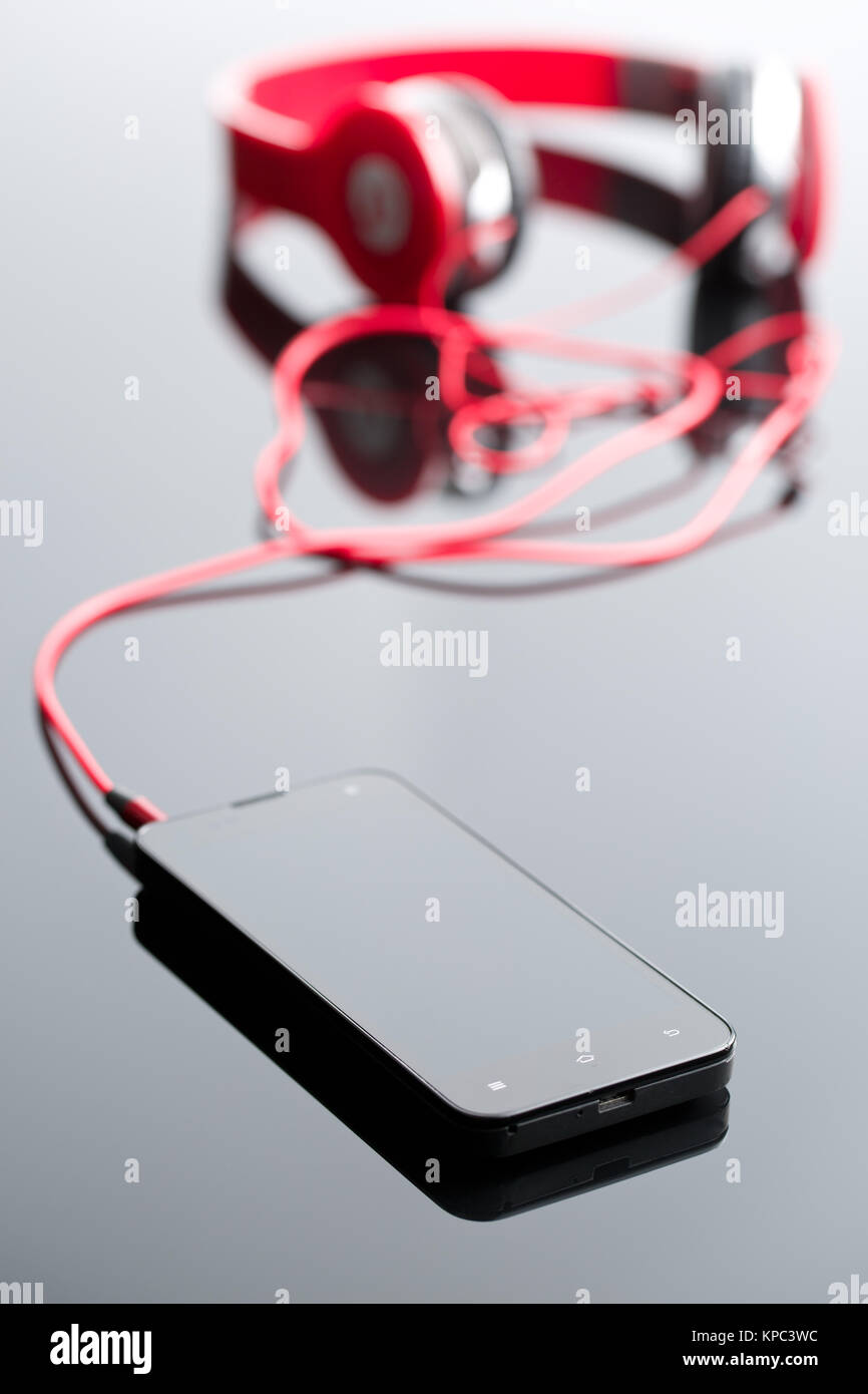 cellphone and headphones Stock Photo - Alamy