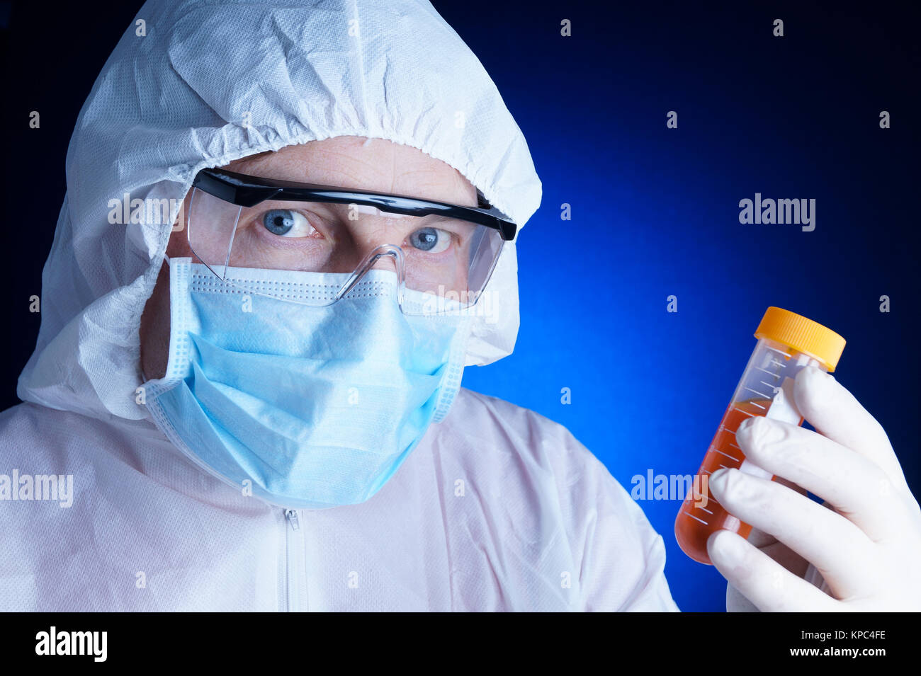 Lab worker testing a sample Stock Photo - Alamy