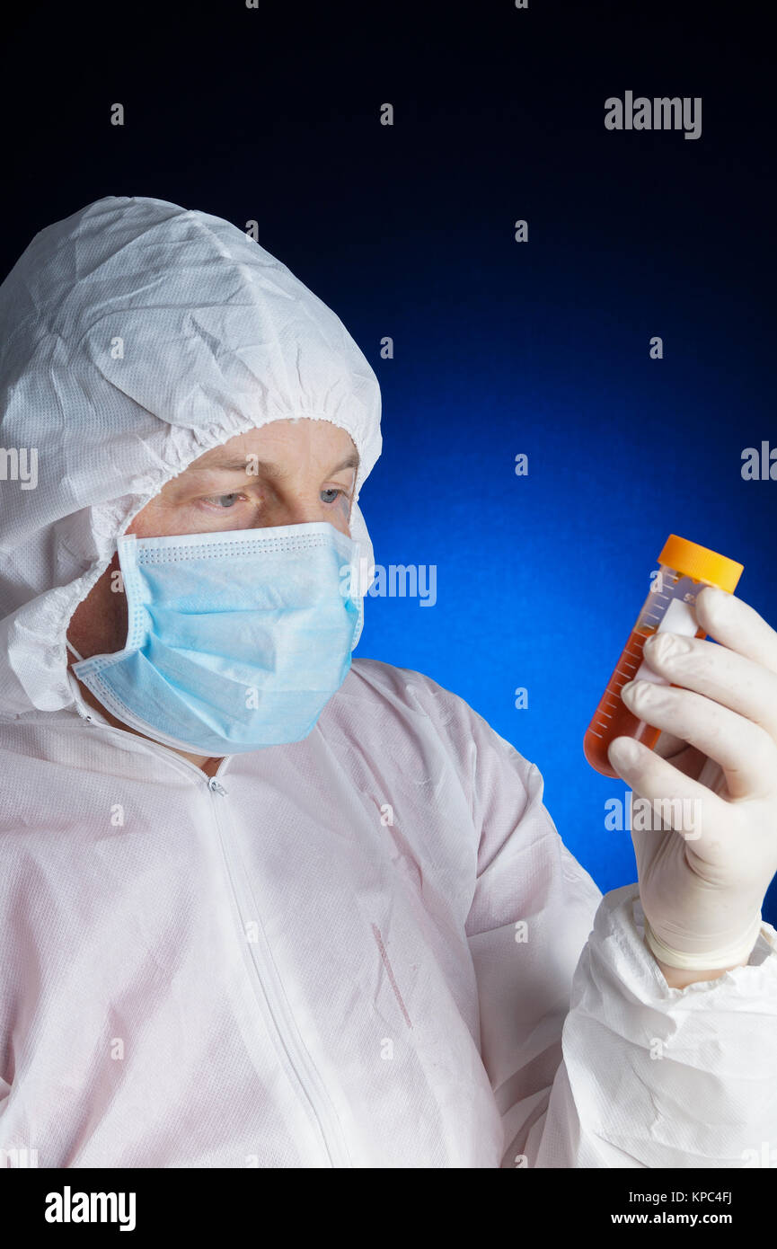 Lab worker testing a sample Stock Photo - Alamy