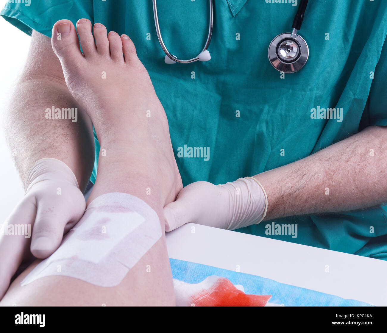 Doctor patches a Injury Stock Photo - Alamy