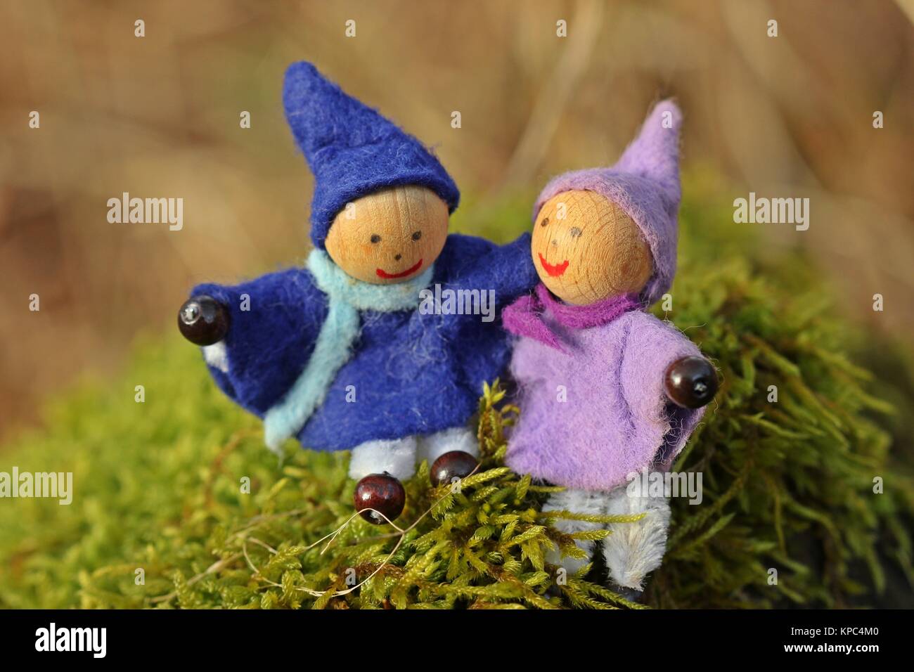 imp couple sitting in the moss Stock Photo - Alamy
