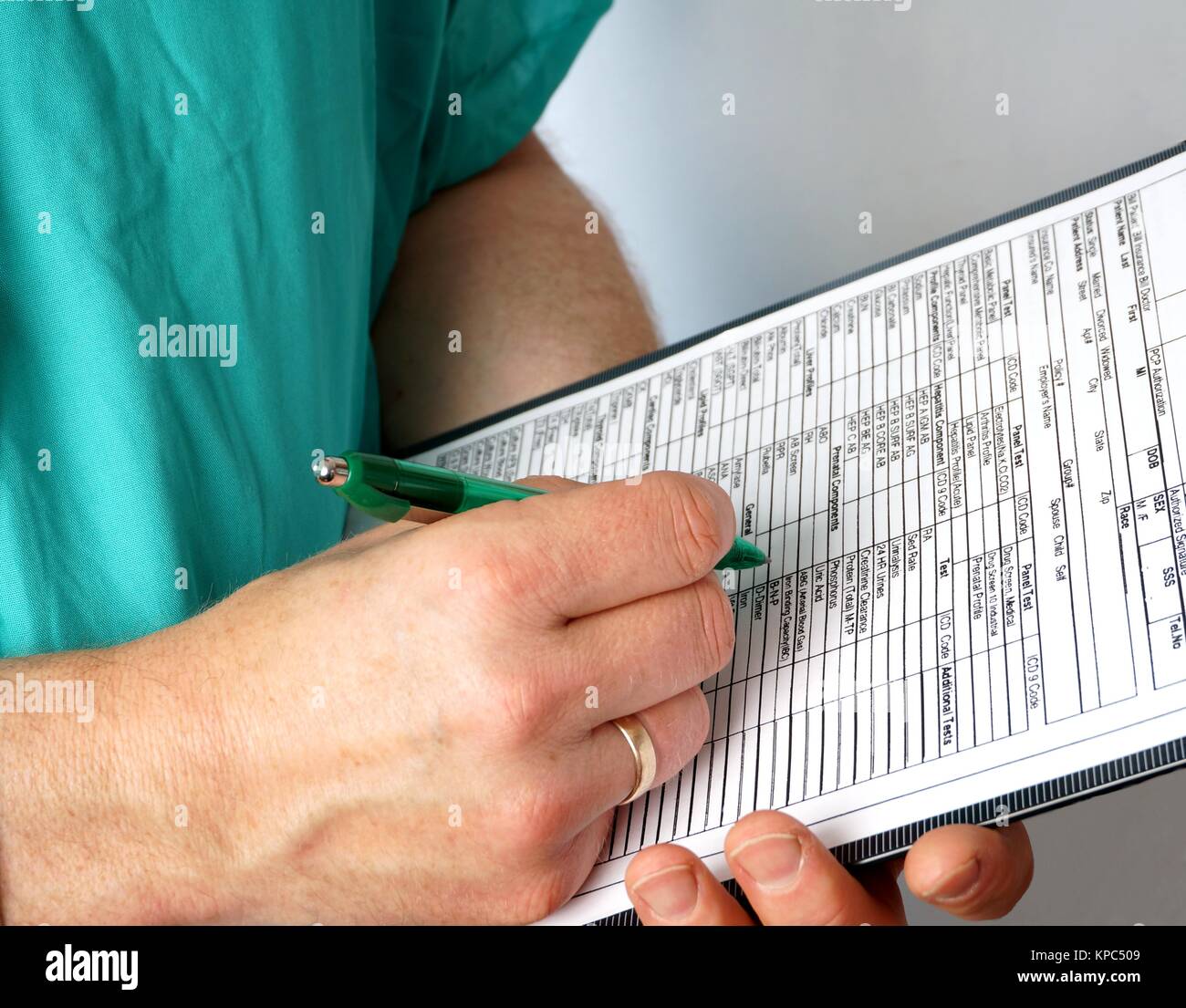 Doctor with medical chart Stock Photo - Alamy