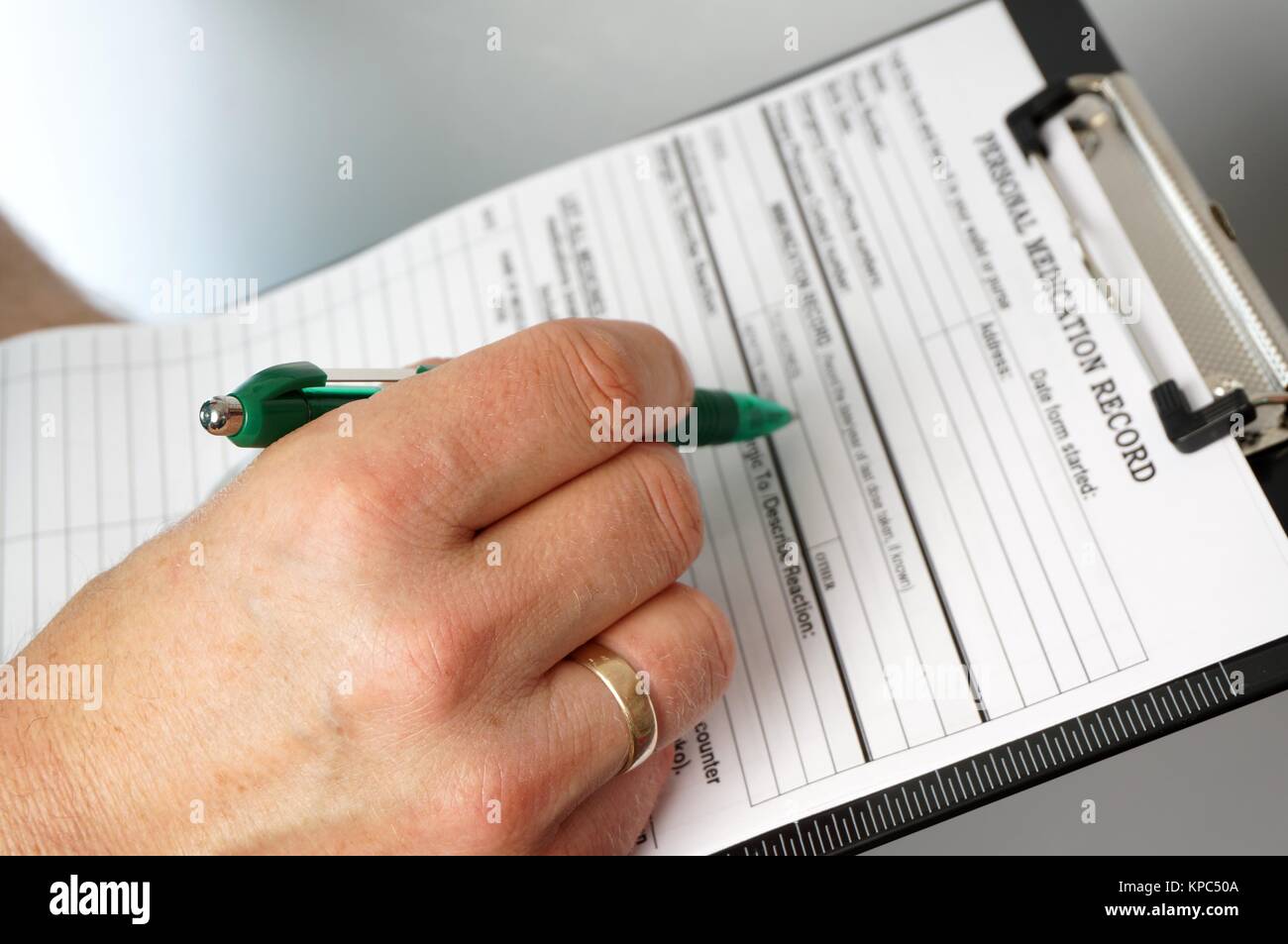 Doctor with medical chart Stock Photo - Alamy