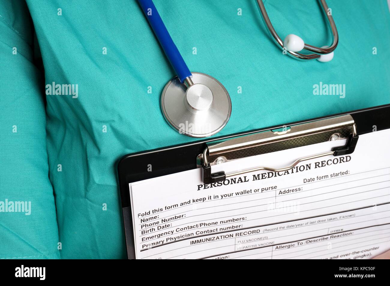 Doctor with medical chart and stethoscope Stock Photo - Alamy
