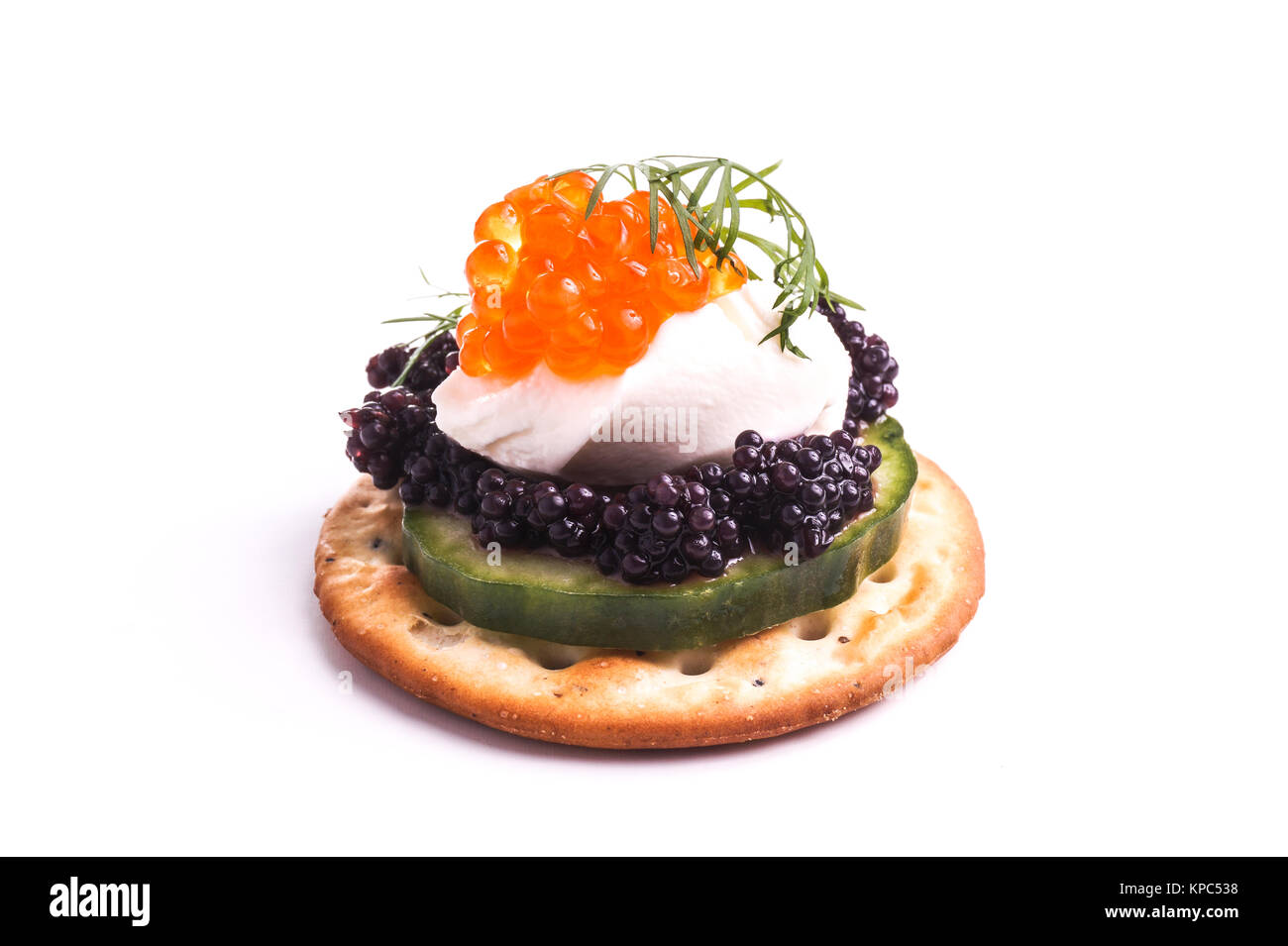Caviar Appetizer served on crackers Stock Photo - Alamy