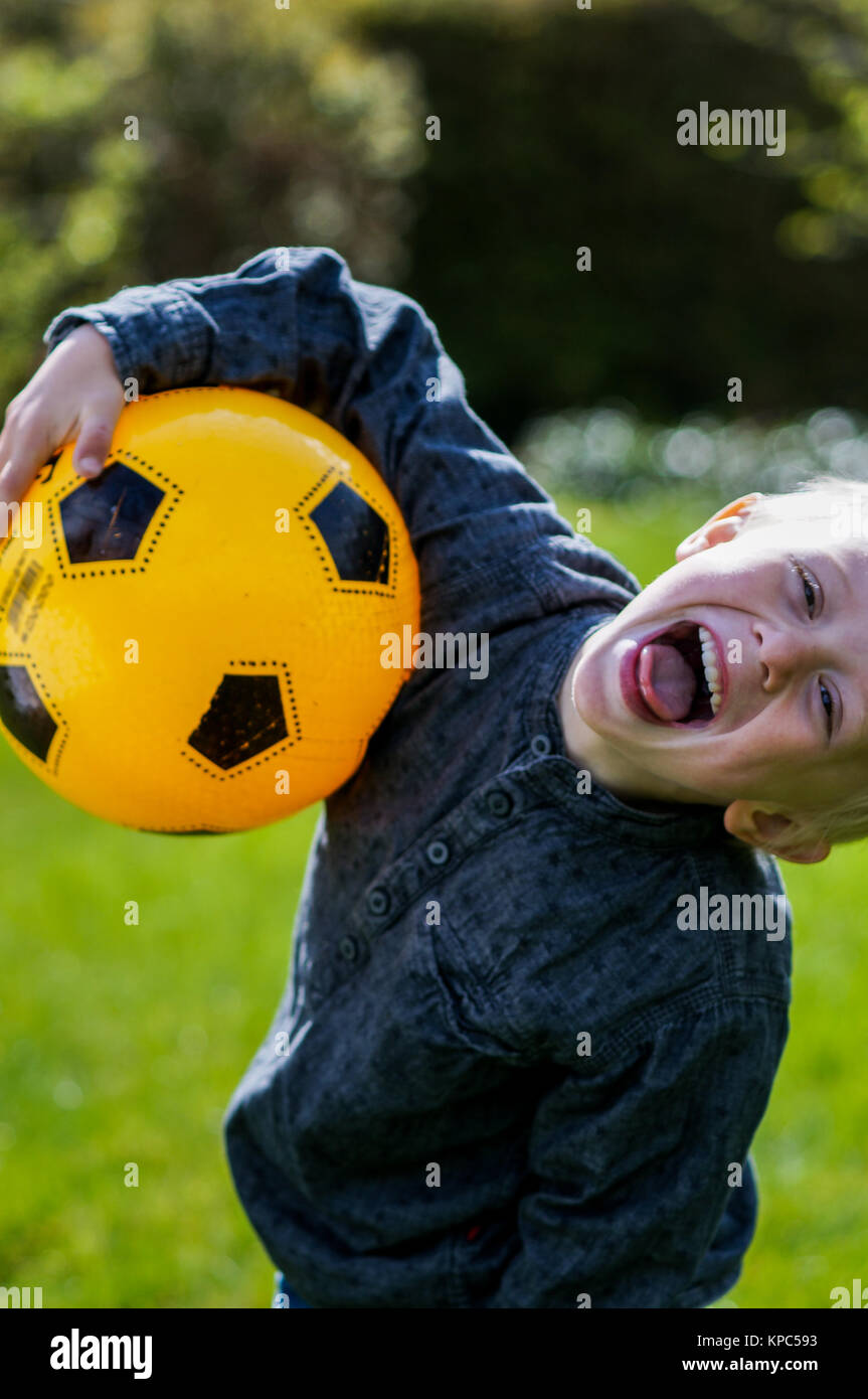Preschool Child with Soccer ball Stock Photo - Alamy