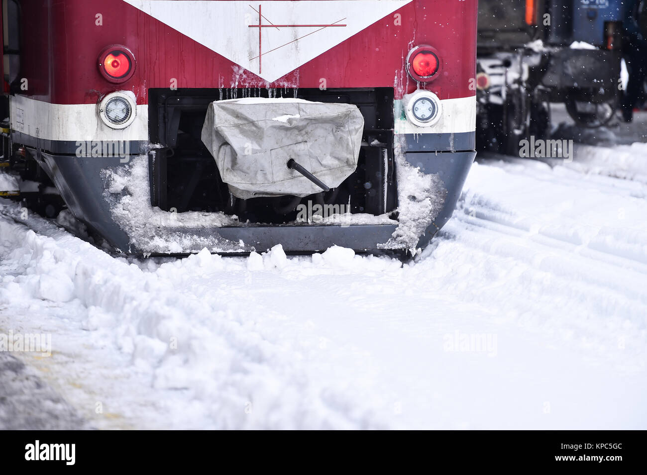 Old train locomotive stuck in train station after heavy snowfall Stock ...