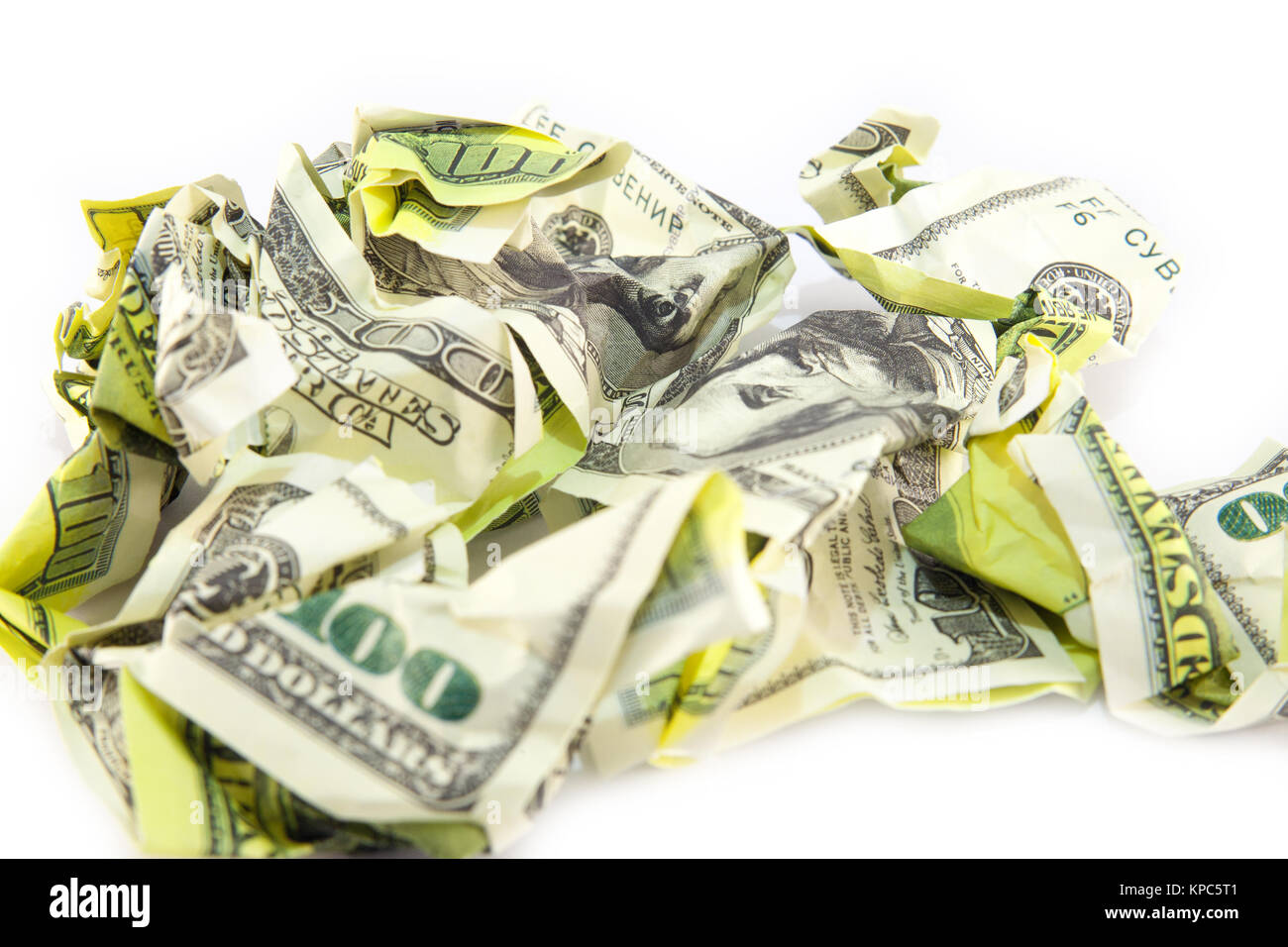 Dollars cut on a white background Stock Photo - Alamy