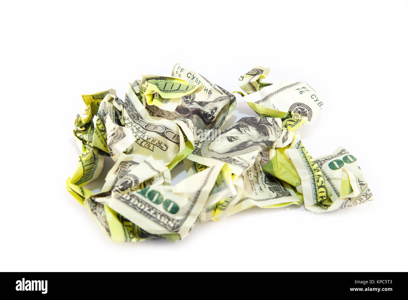 Dollars cut on a white background Stock Photo - Alamy