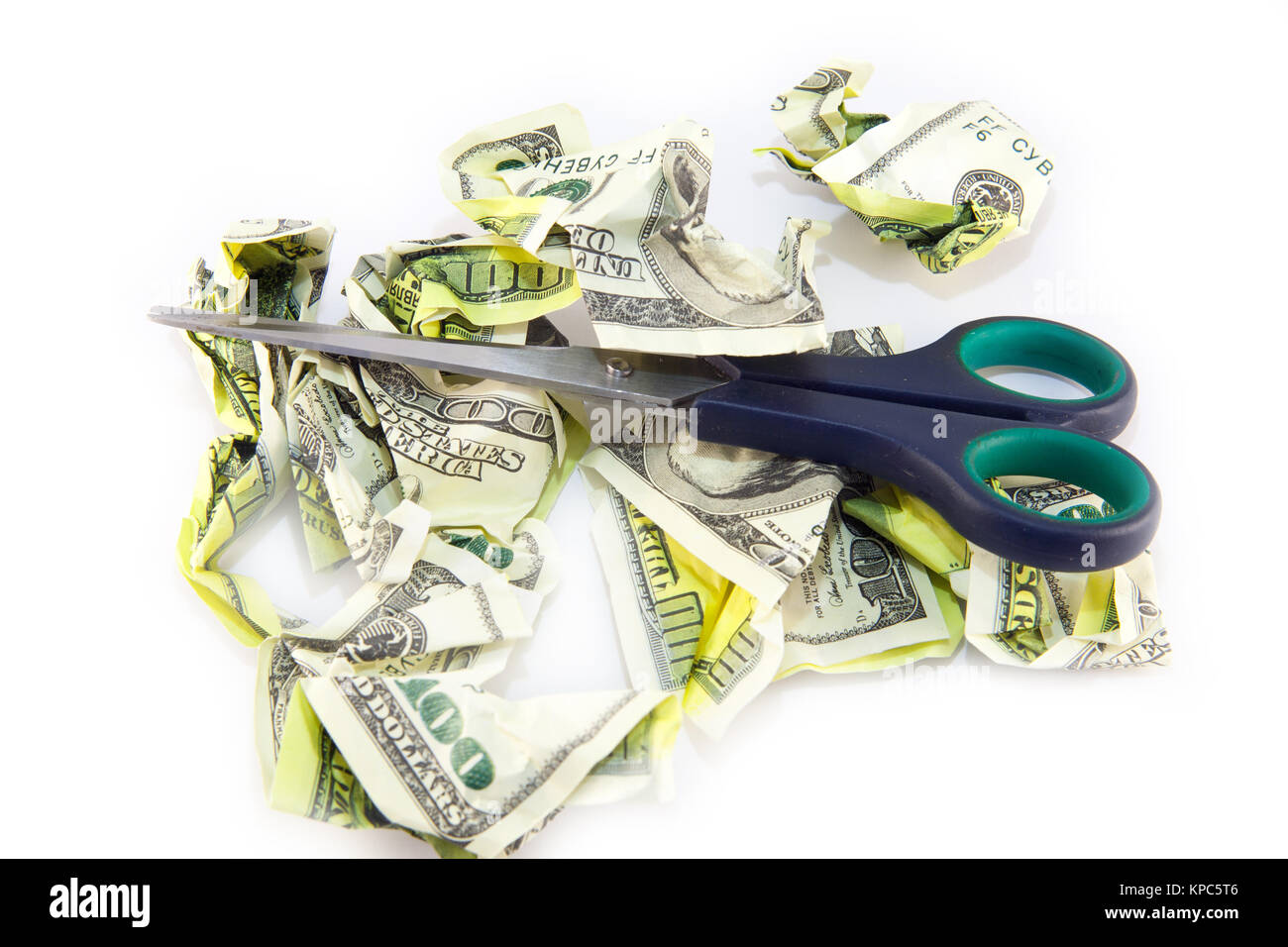 Dollars cut on a white background Stock Photo - Alamy