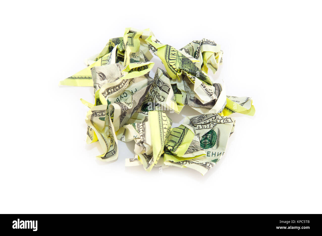 Dollars cut on a white background Stock Photo - Alamy