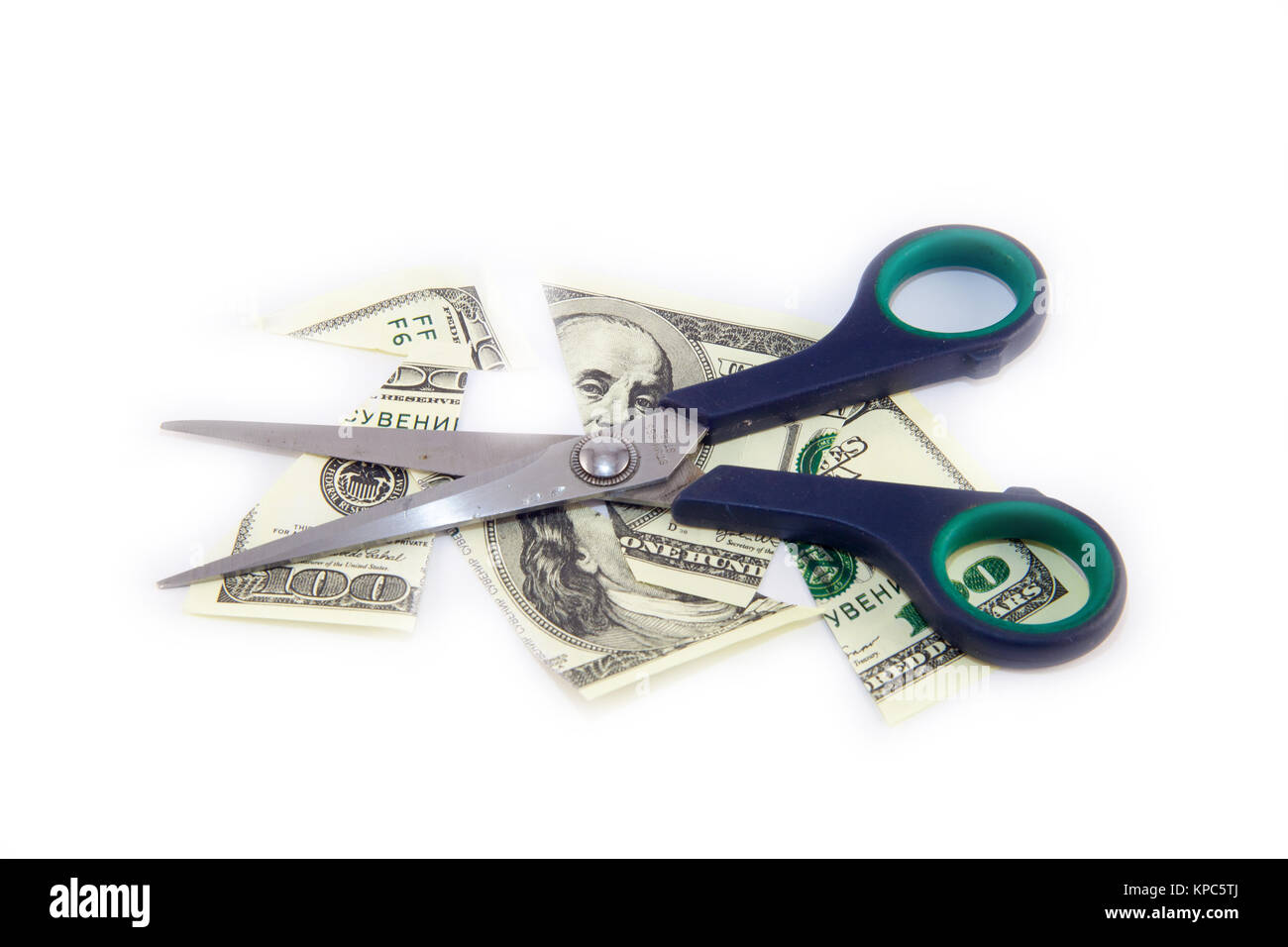 Dollars cut on a white background Stock Photo - Alamy