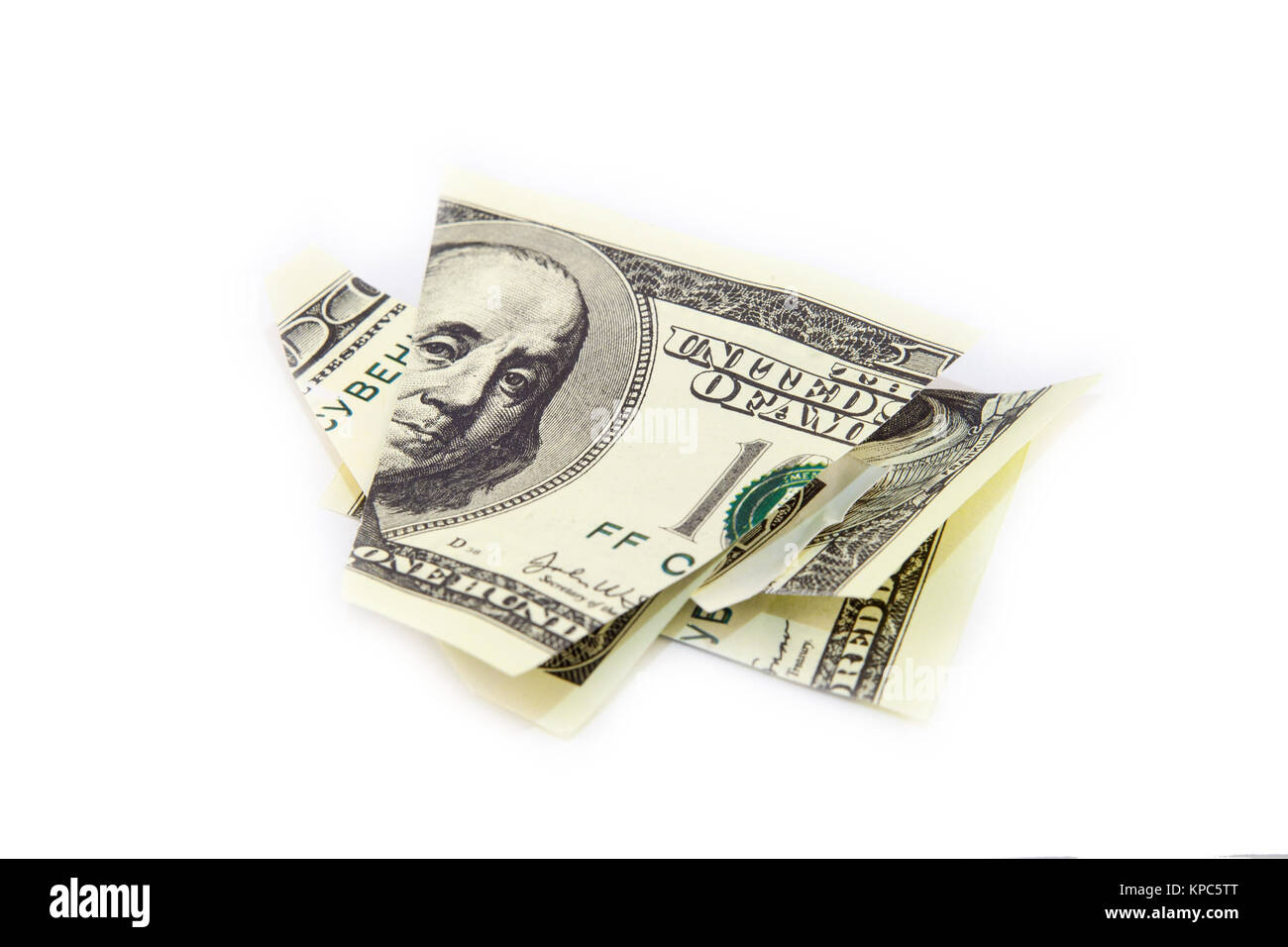 Dollars cut on a white background Stock Photo - Alamy