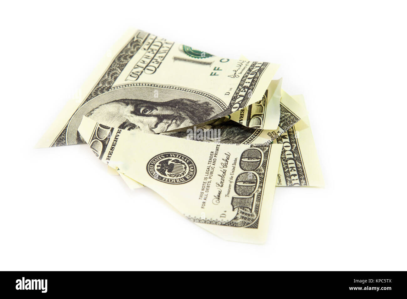 Dollars cut on a white background Stock Photo - Alamy