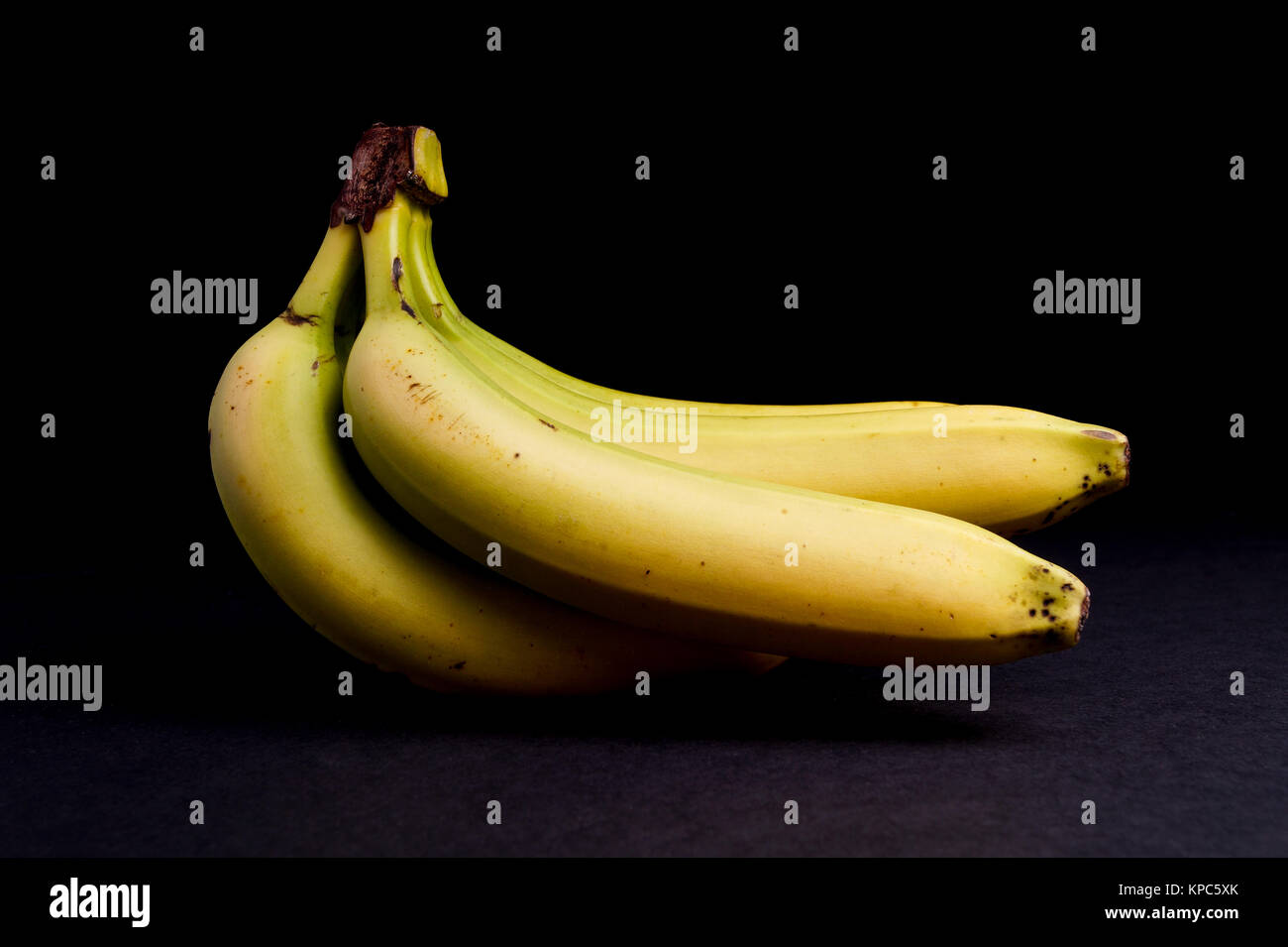 Bunch of ripe Organic bananas Stock Photo - Alamy
