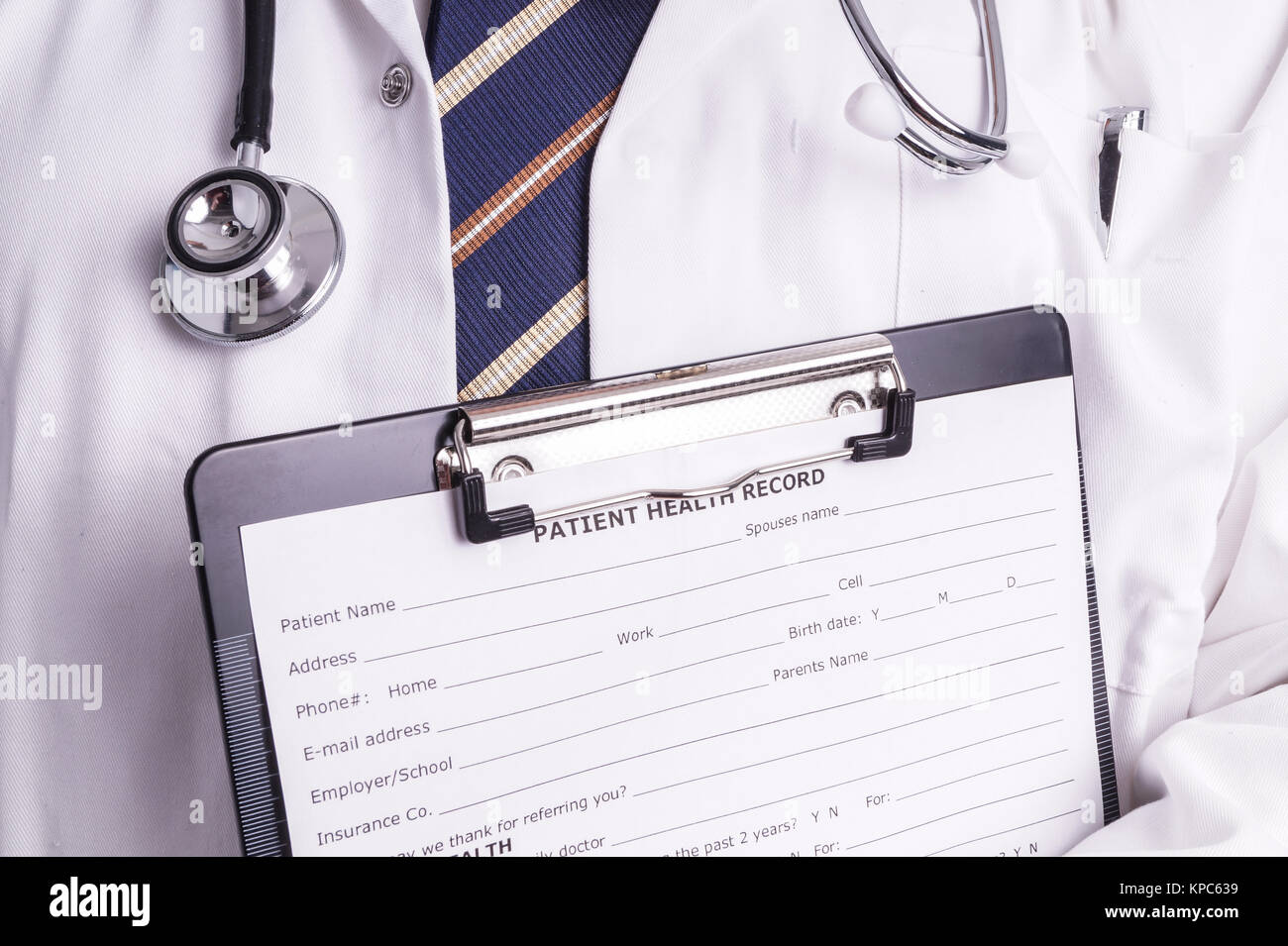 Male doctor ready to write patient information Stock Photo - Alamy