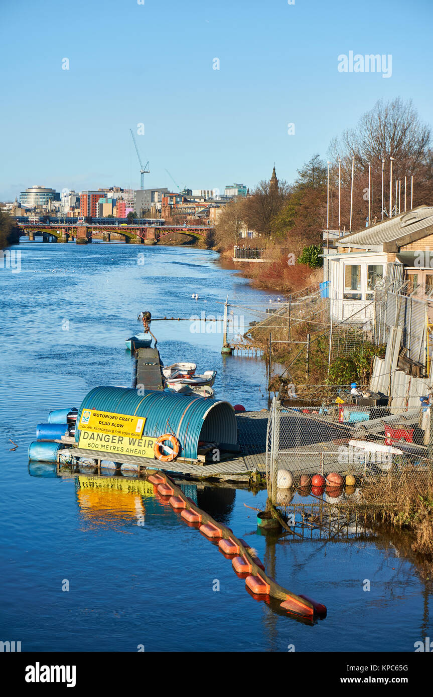 Warning sign on the river Clyde in Glasgow informing of tidal weir ...