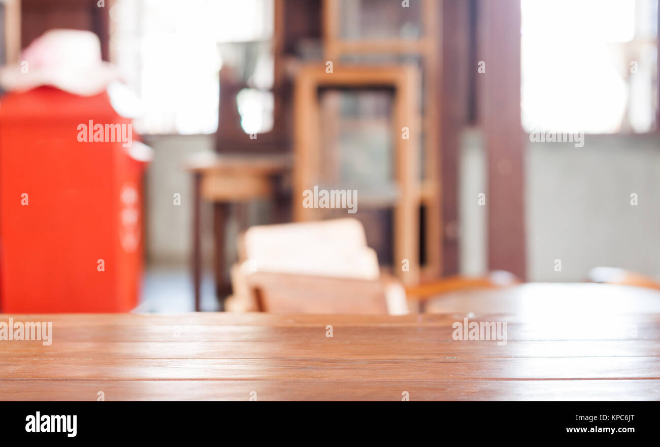 Empty wooden table in coffee shop Stock Photo - Alamy