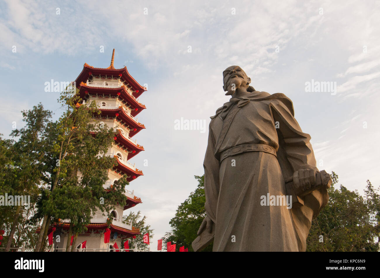 Historical Chinese statue and traditional Oriental pagoda in Chinese ...