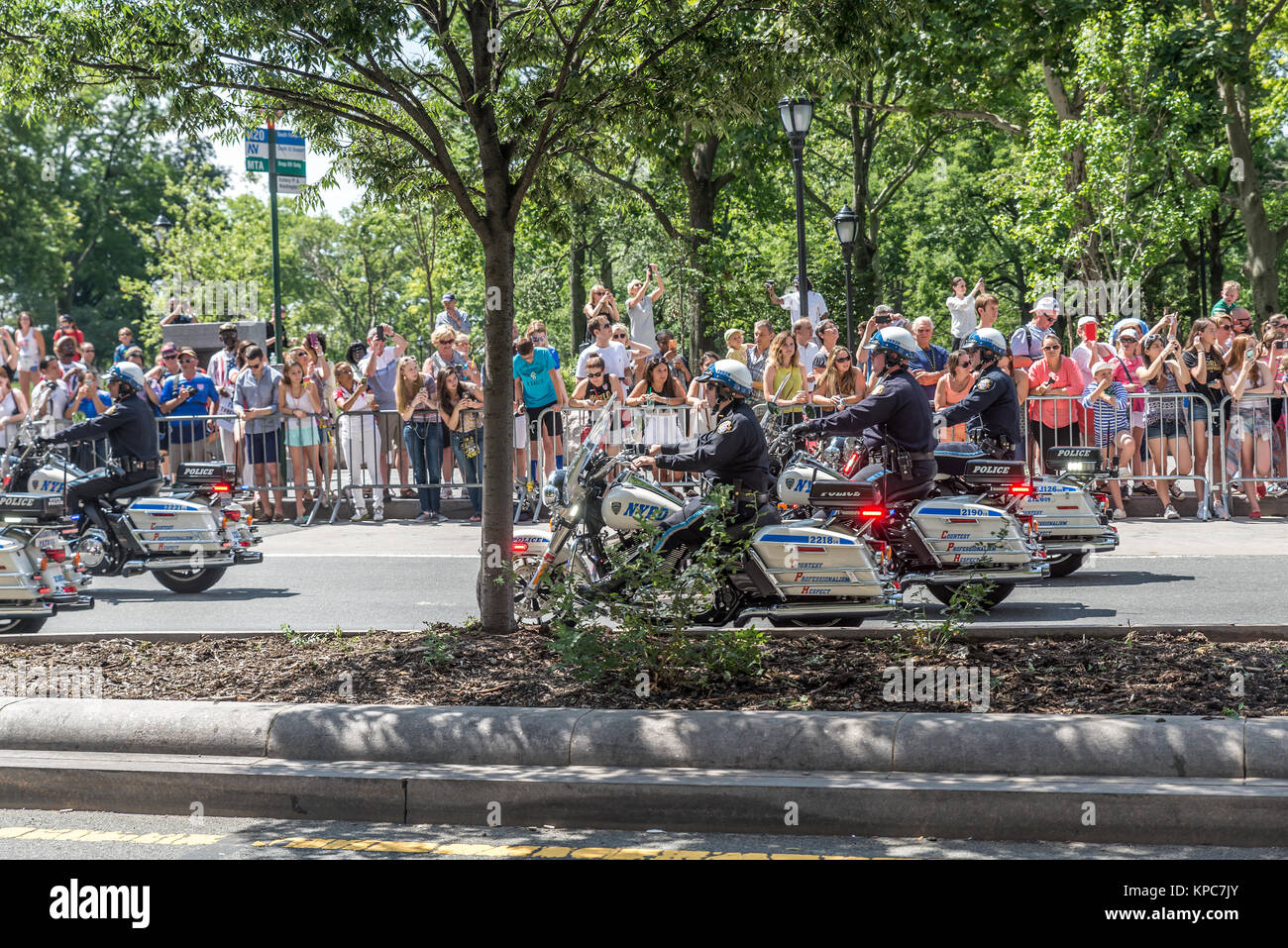 NEW YORK - JULY 10: Police officers drive motorcycles during the parade ...